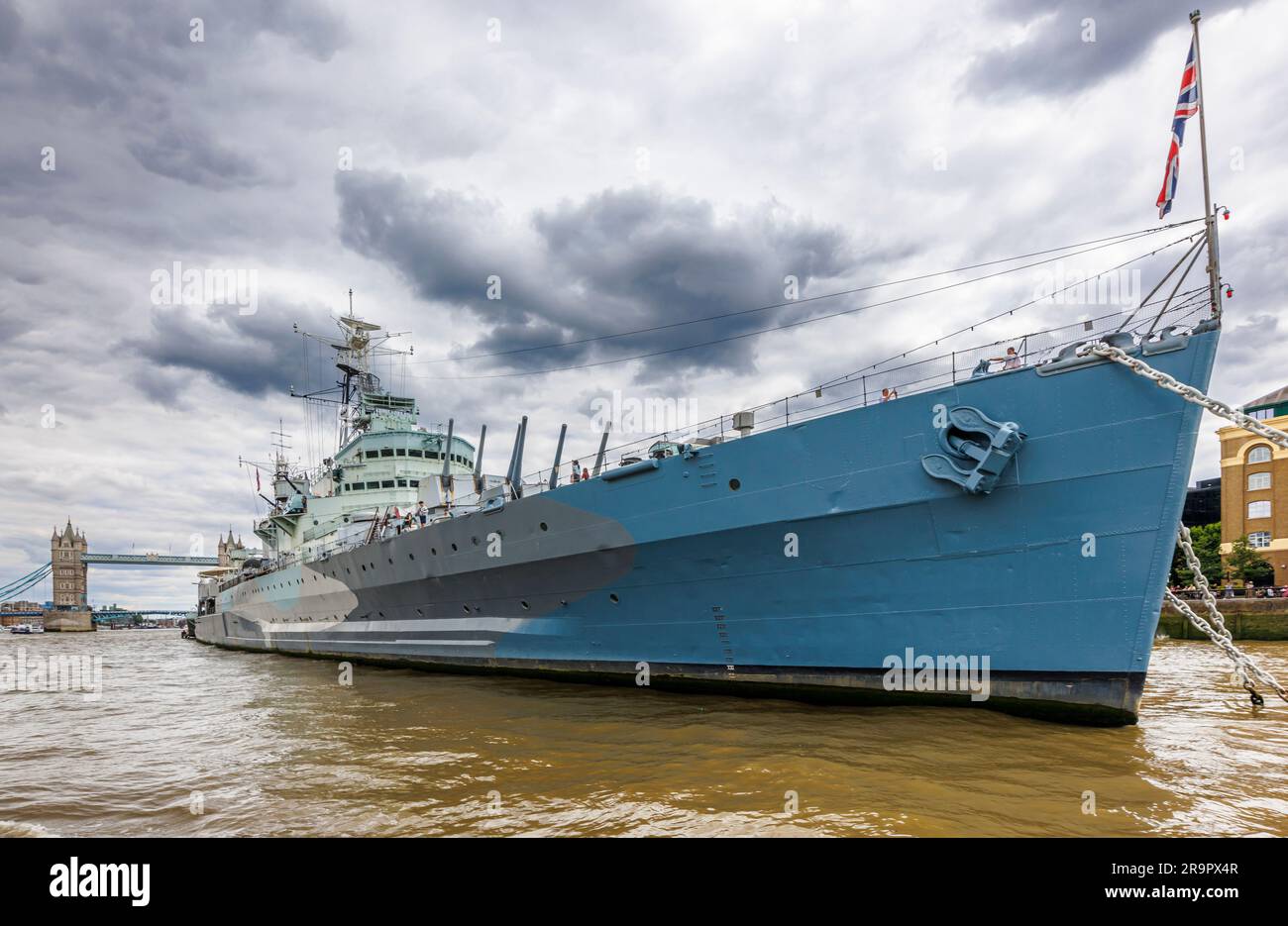 The iconic cruiser HMS Belfast moored on the River Thames in the Pool ...