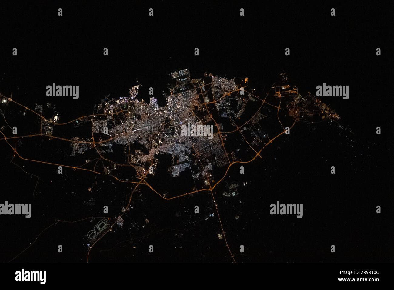 . iss068e043827 (Jan. 30, 2023) - The city lights of Doha, Qatar, are ...