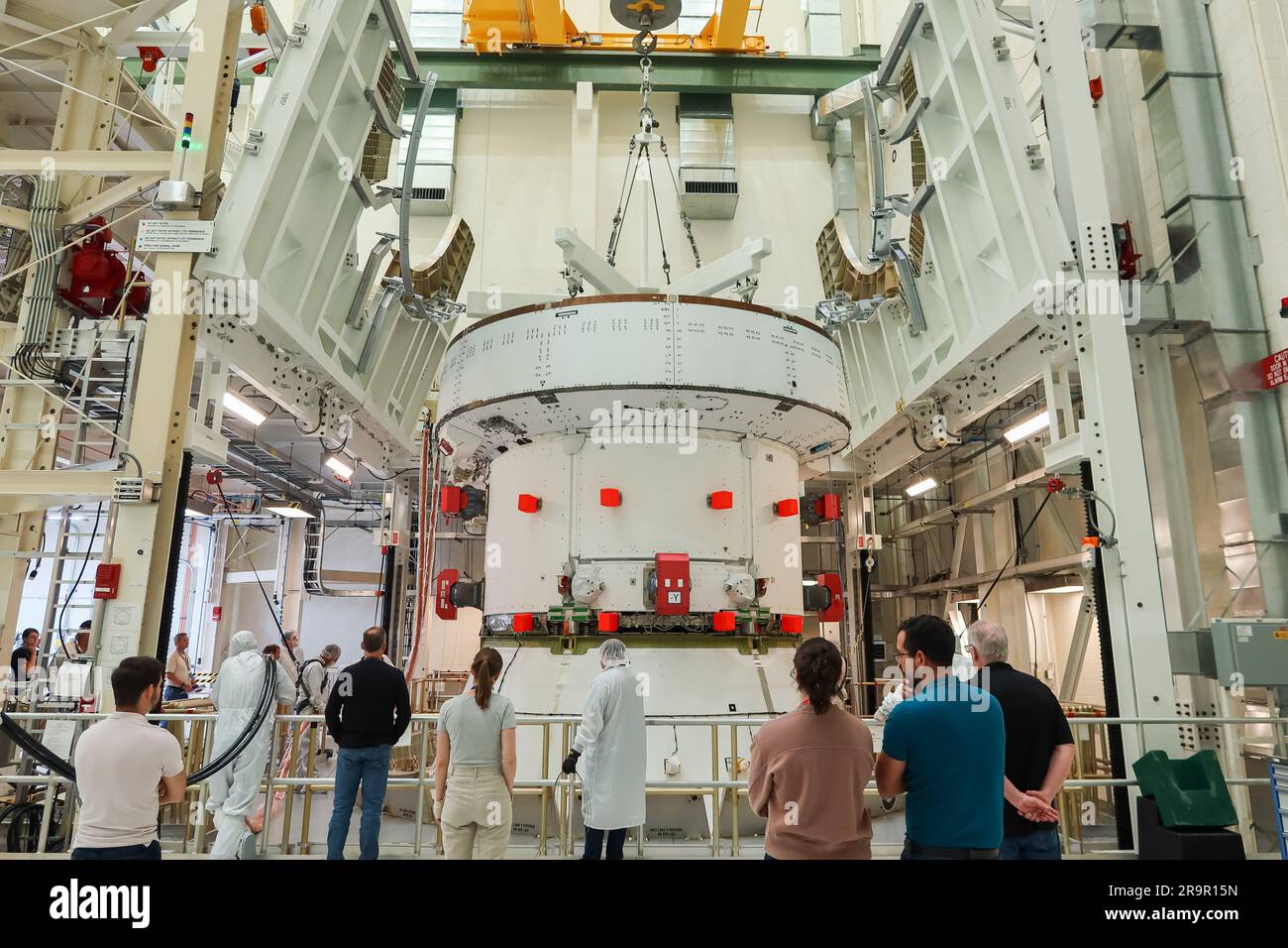 Artemis II SM Move to Fast Cell. A crane lowers the European Service Module (ESM) for NASA’s ...