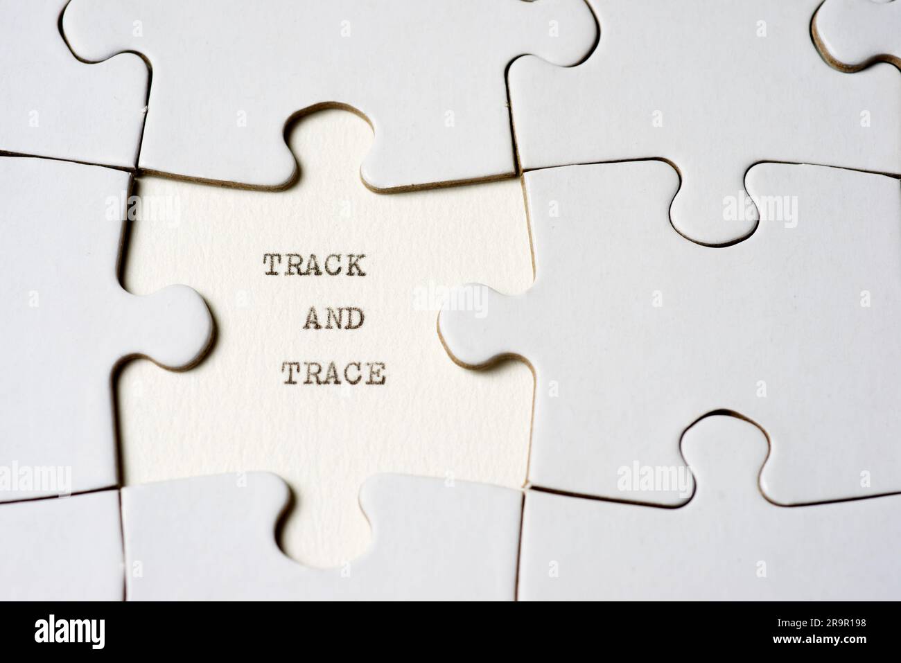 Track and trace text written with a typewriter in a white puzzle Stock ...