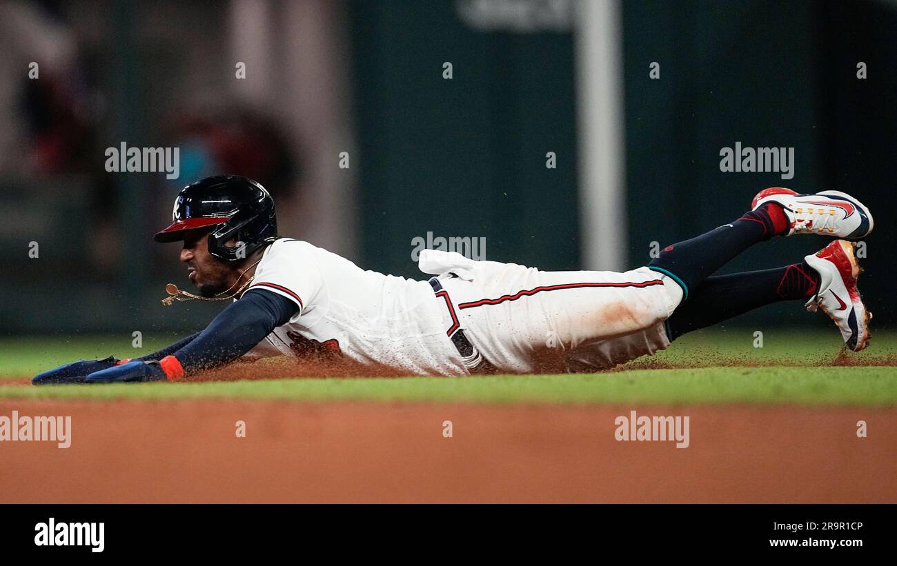 Atlanta Braves second baseman Ozzie Albies (1) slides into into second ...