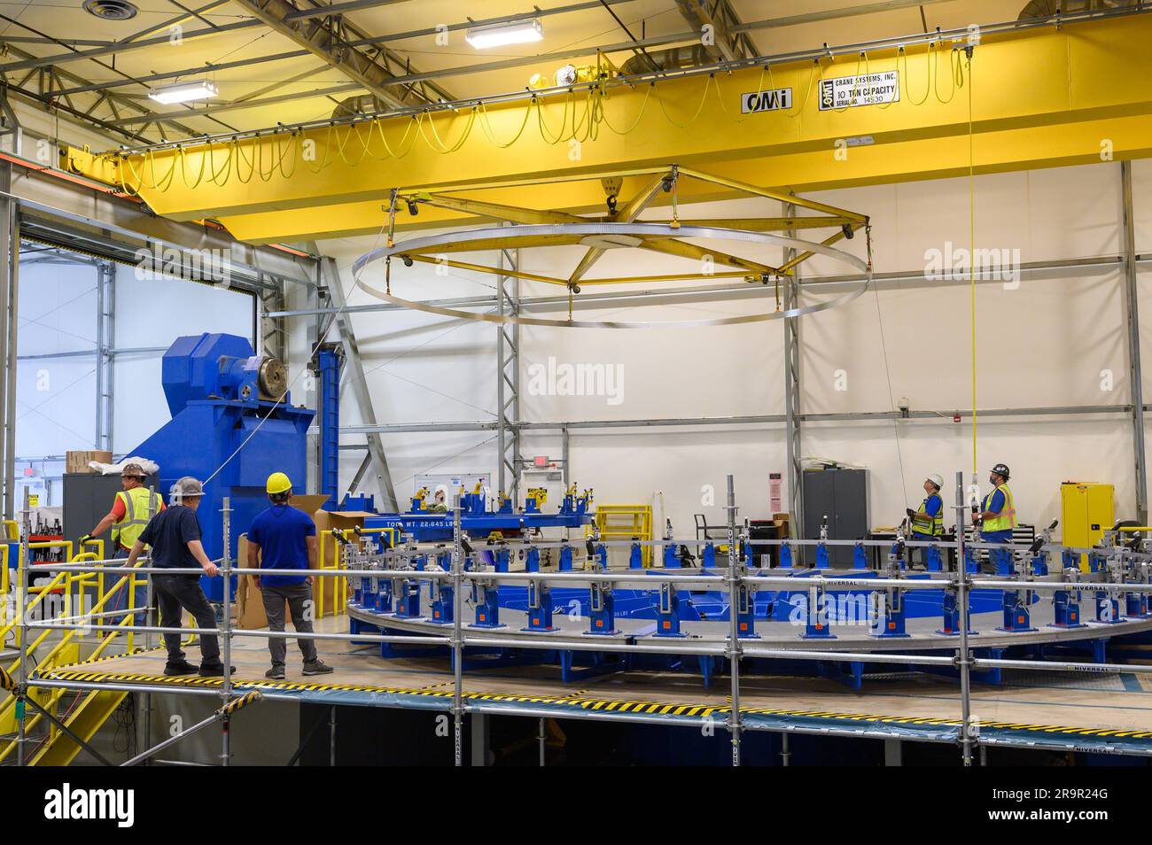 NASA technicians at Michoud move a ring for the Exploration Upper Stage ...