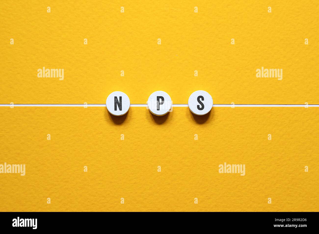 NPS - NET PROMOTER SCORE, word concept on building blocks, text ...