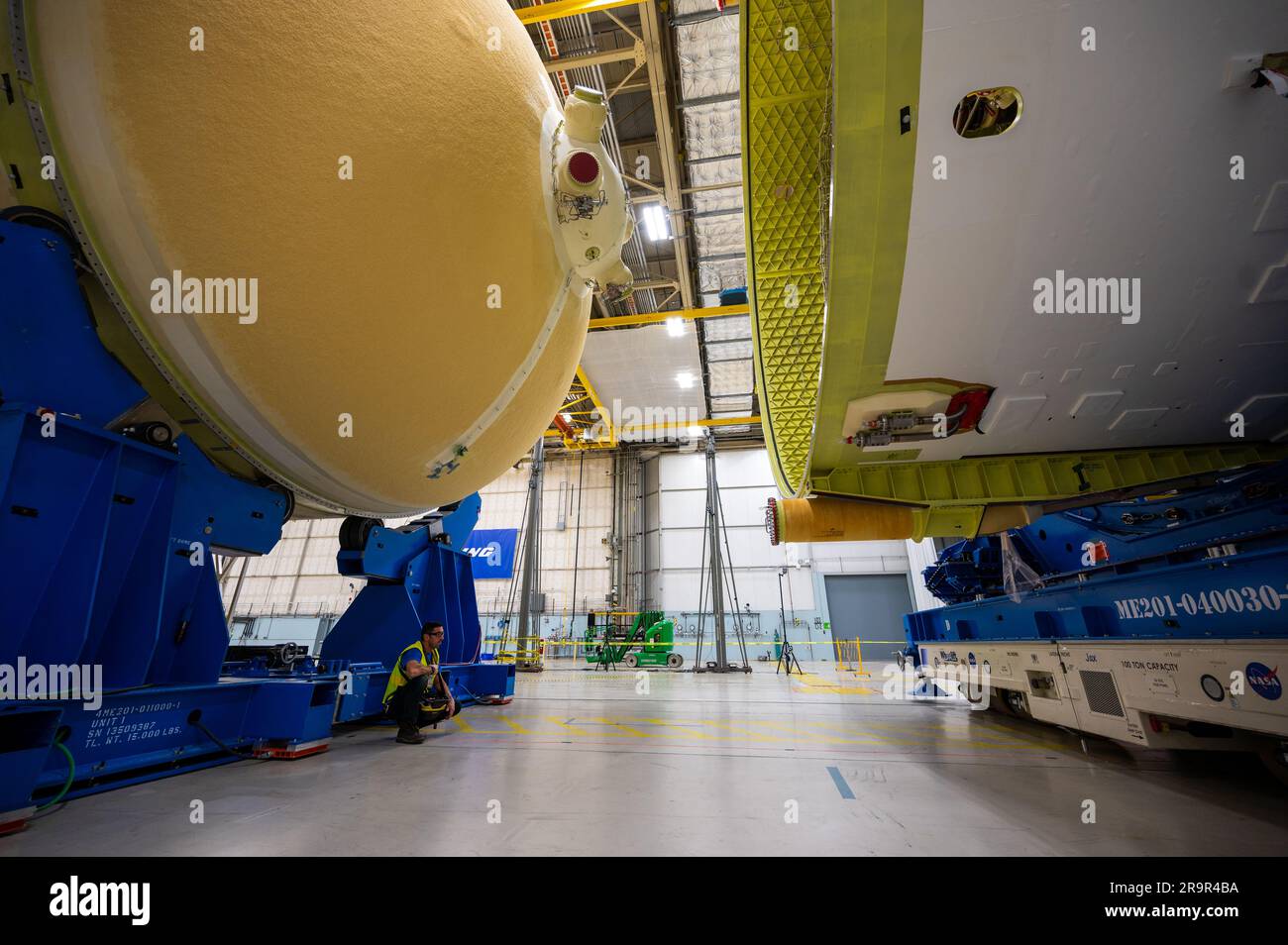 Technicians at NASA’s Michoud Assembly Facility positioned the SLS ...