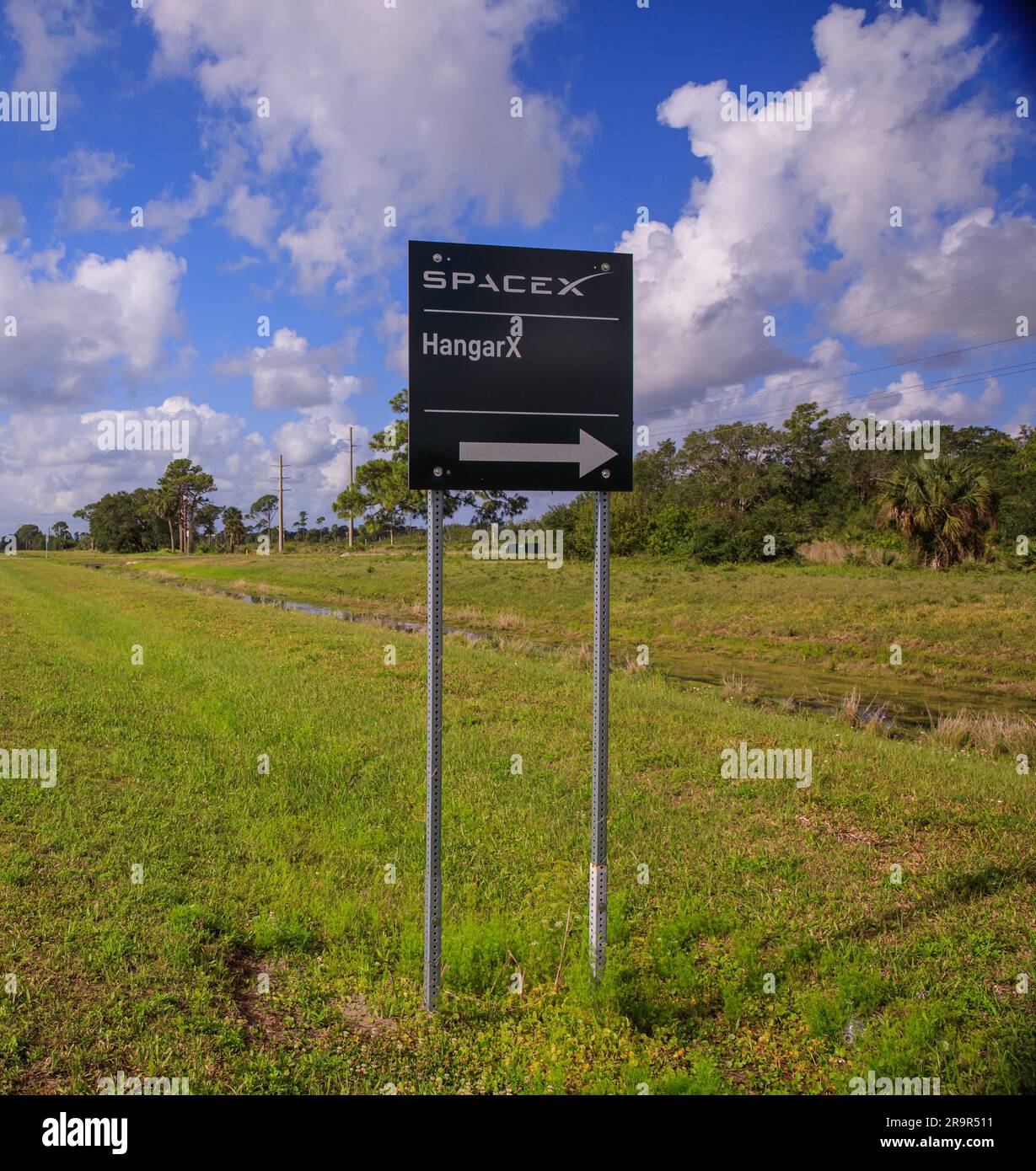 SpaceX Roberts Road Expansion. A sign marks the entrance to SpaceX’s ...