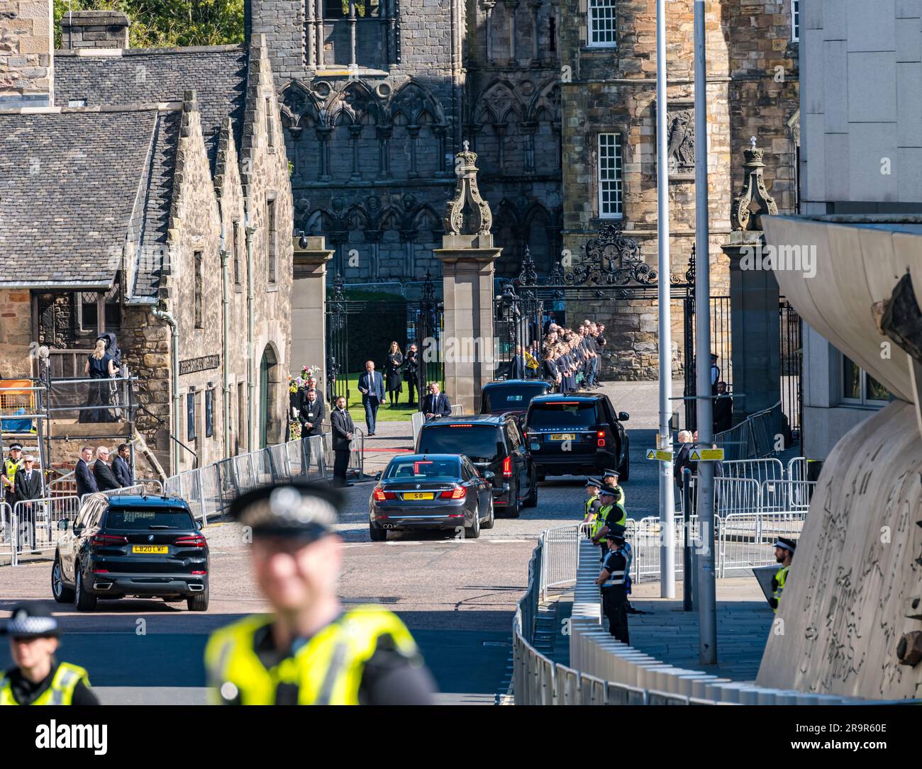 Police security at Holyrood Palace with Royals in convy entering gates ...
