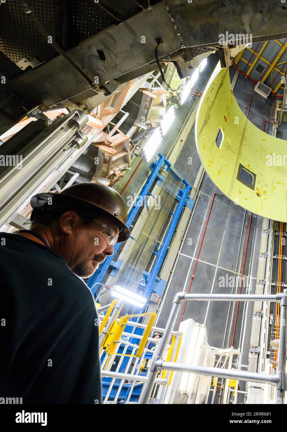 . Technicians at NASA’s Michoud Assembly Facility move the intertank of ...