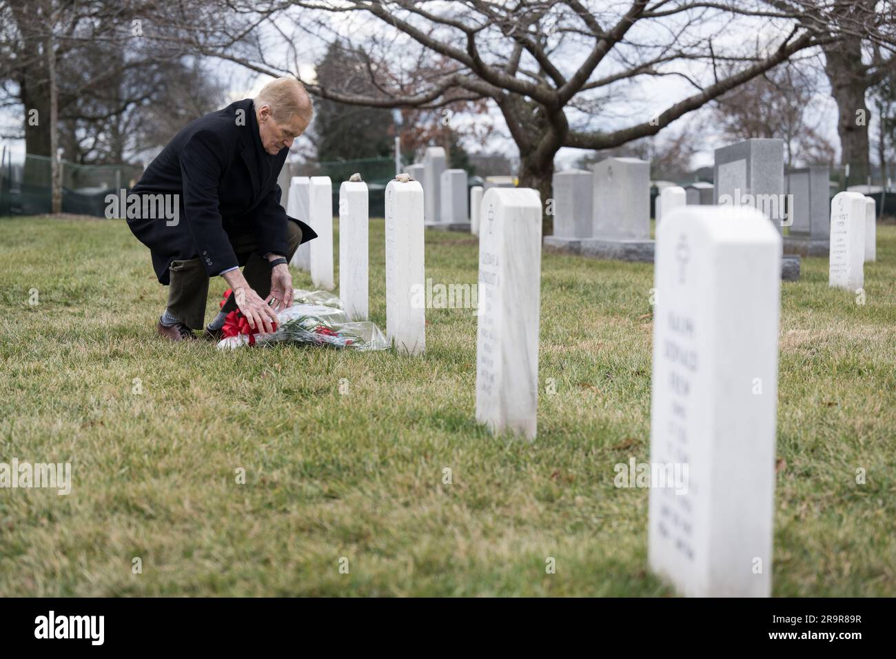 Day of Remembrance. NASA Administrator Bill Nelson lays flowers at the ...