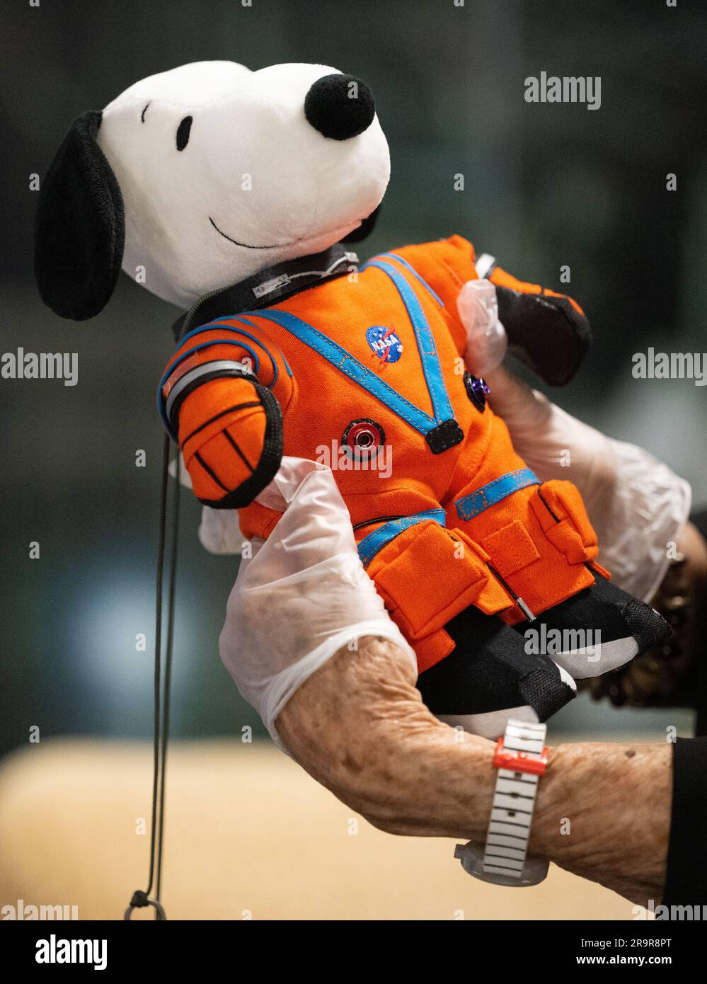 Jeannie Schulz held the Artemis I Snoopy zero gravity indicator during ...
