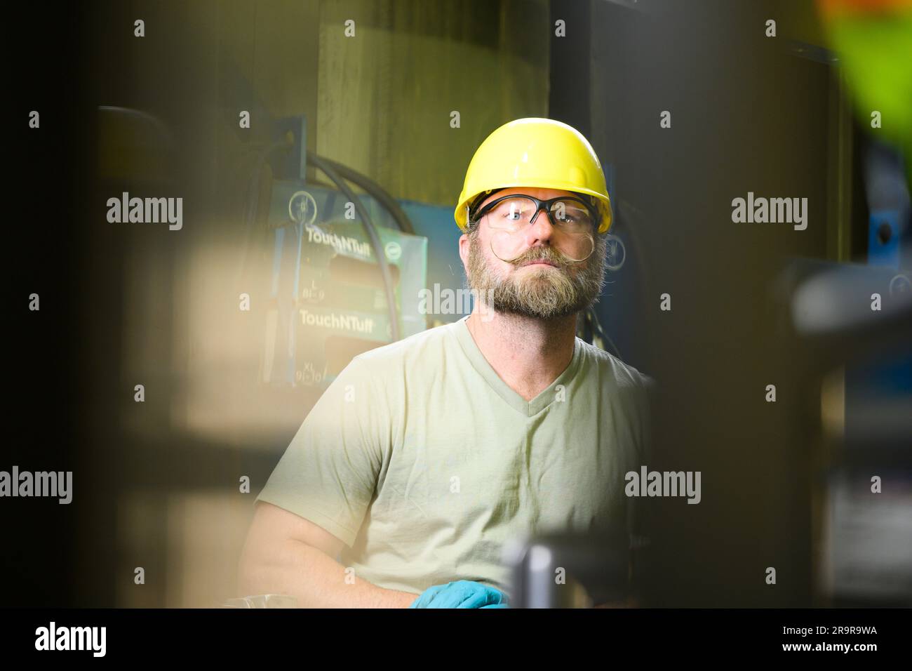 . Technicians at NASA’s Michoud Assembly Facility move the intertank of ...