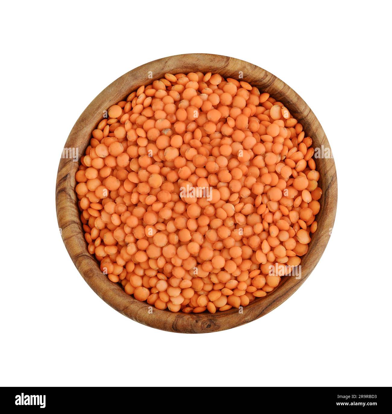 Dry raw organic red lentils in wooden bowl isolated on white background ...
