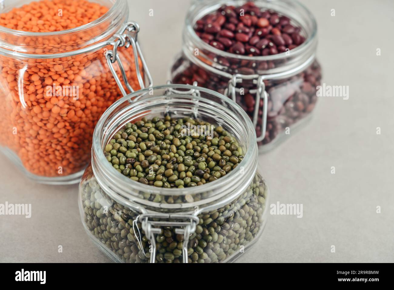 Mung beans, beans, red lentils in glass jars. Zero waste storage ...