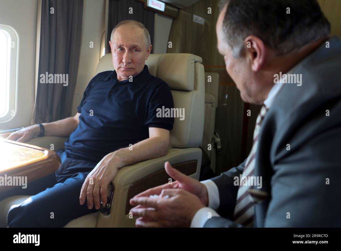 Russian President Vladimir Putin, left, listens to Head of the Republic ...
