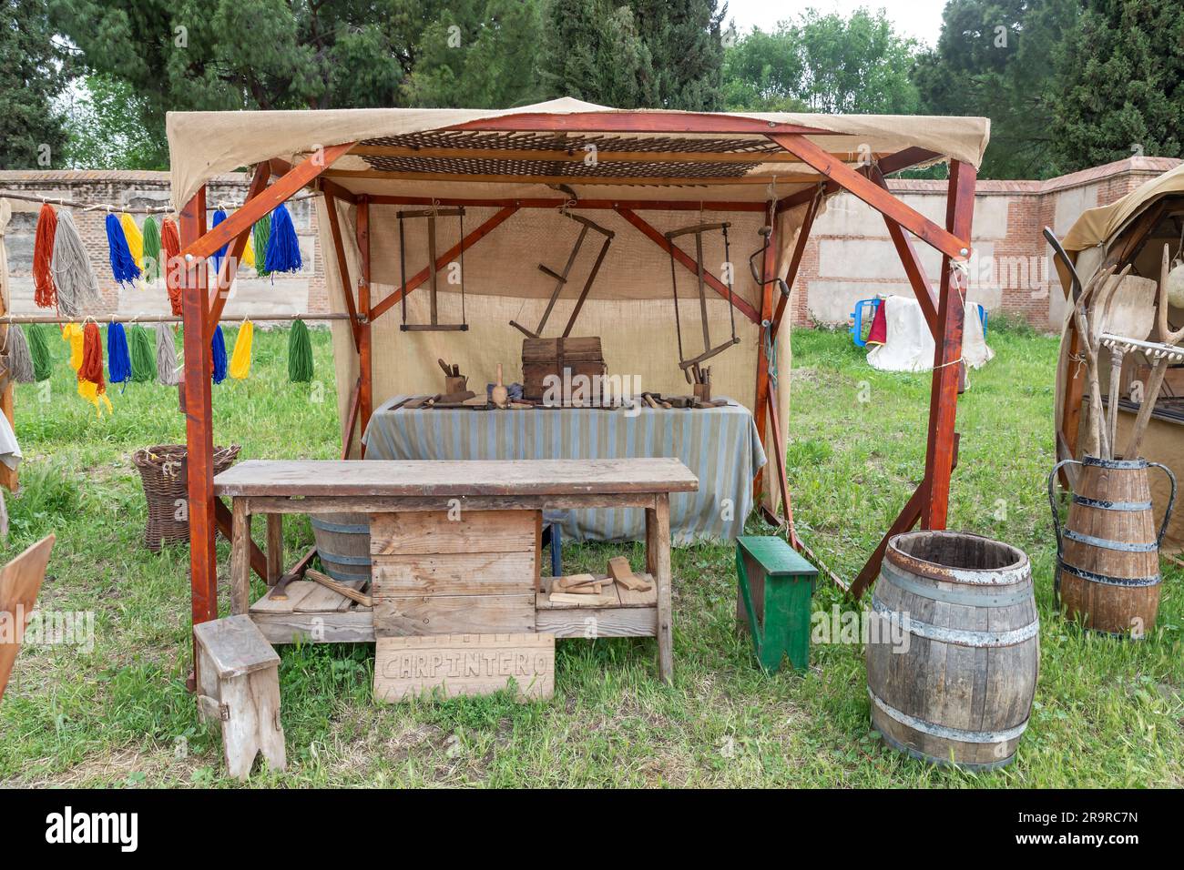 outdoor scene in horizontal view of the recreation of a carpentry from ...