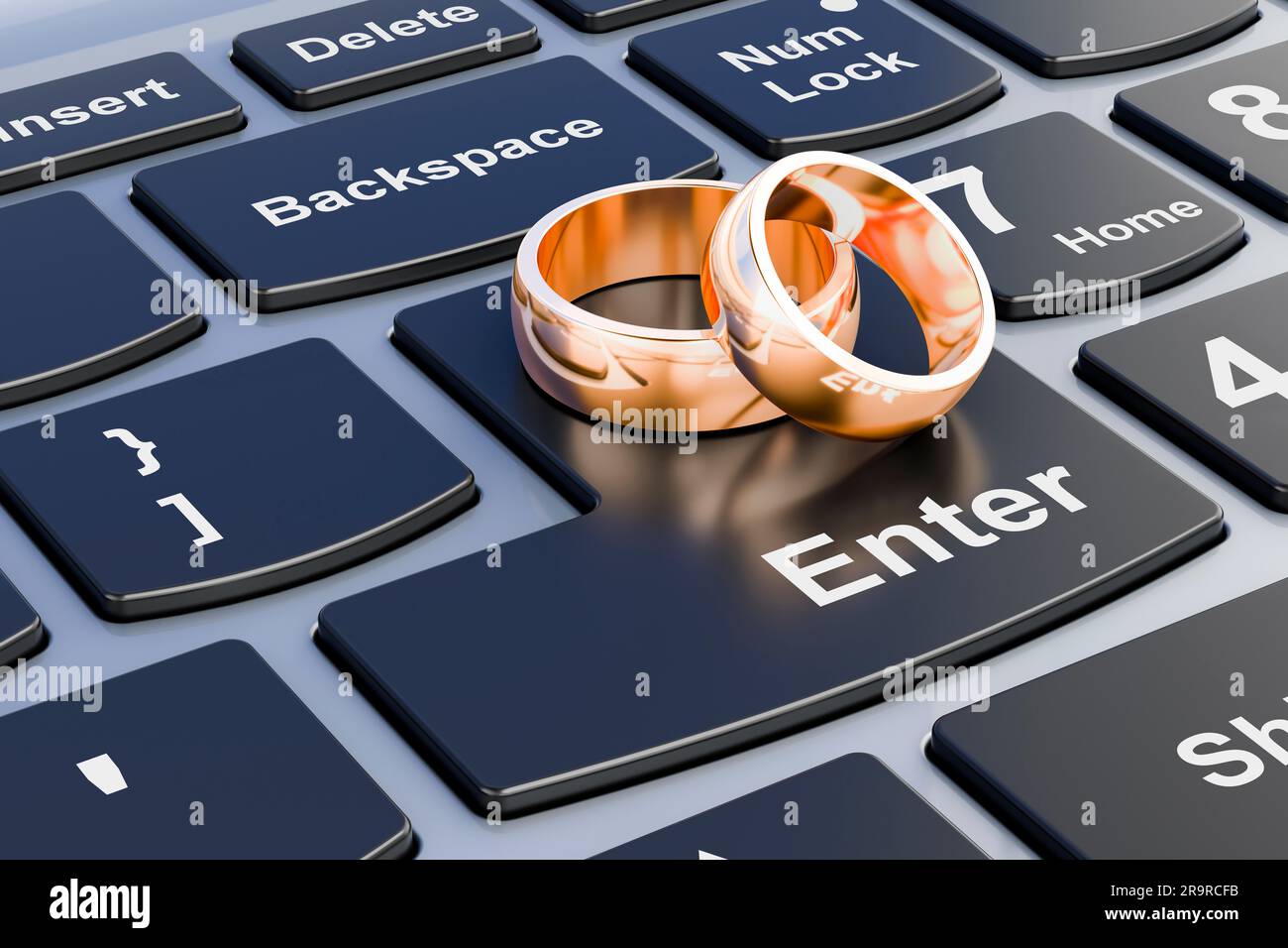 Golden wedding rings on laptop keyboard. 3D rendering Stock Photo - Alamy