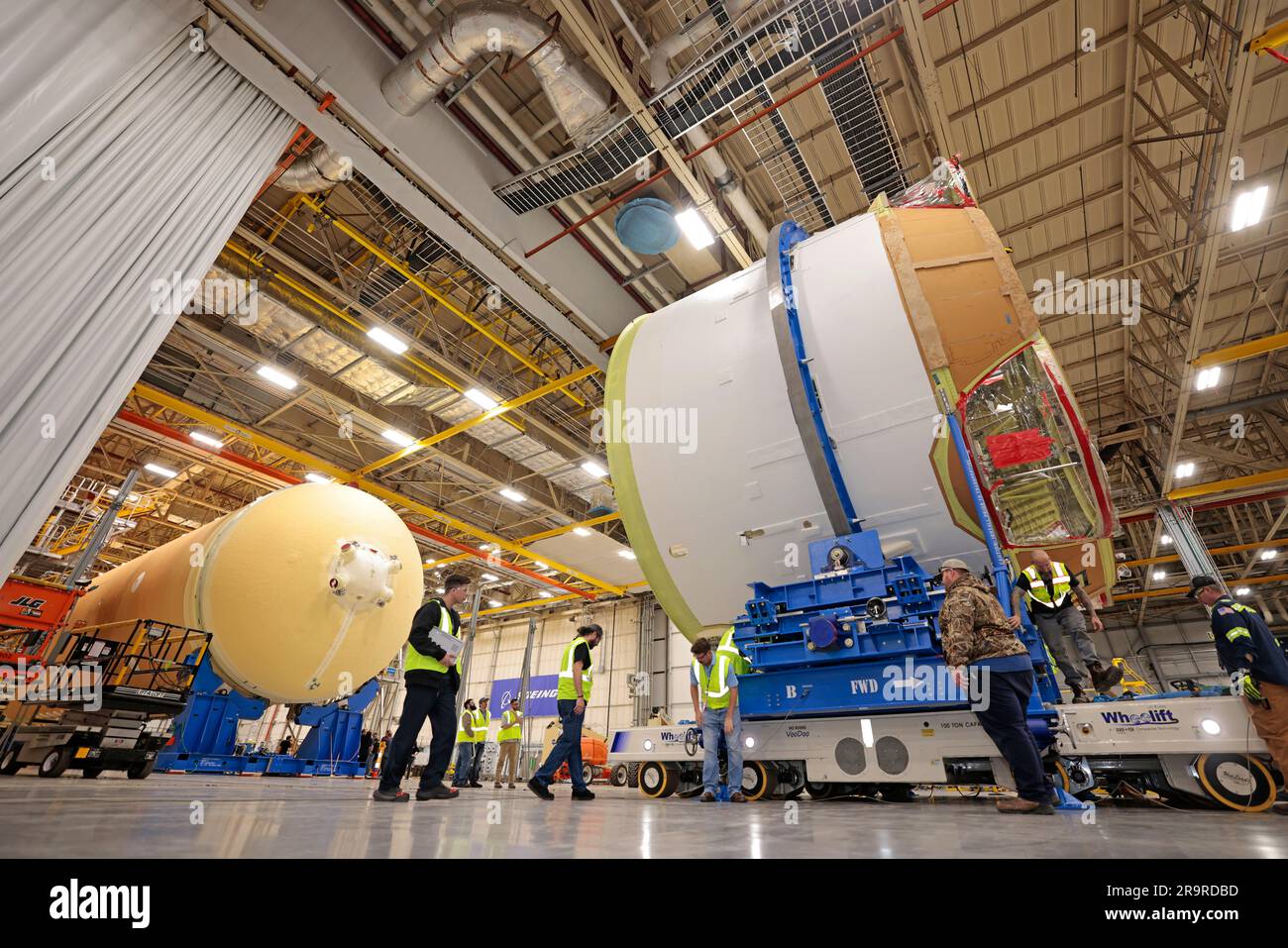 Teams Move Artemis II SLS Engine Section into Position for Final Join ...