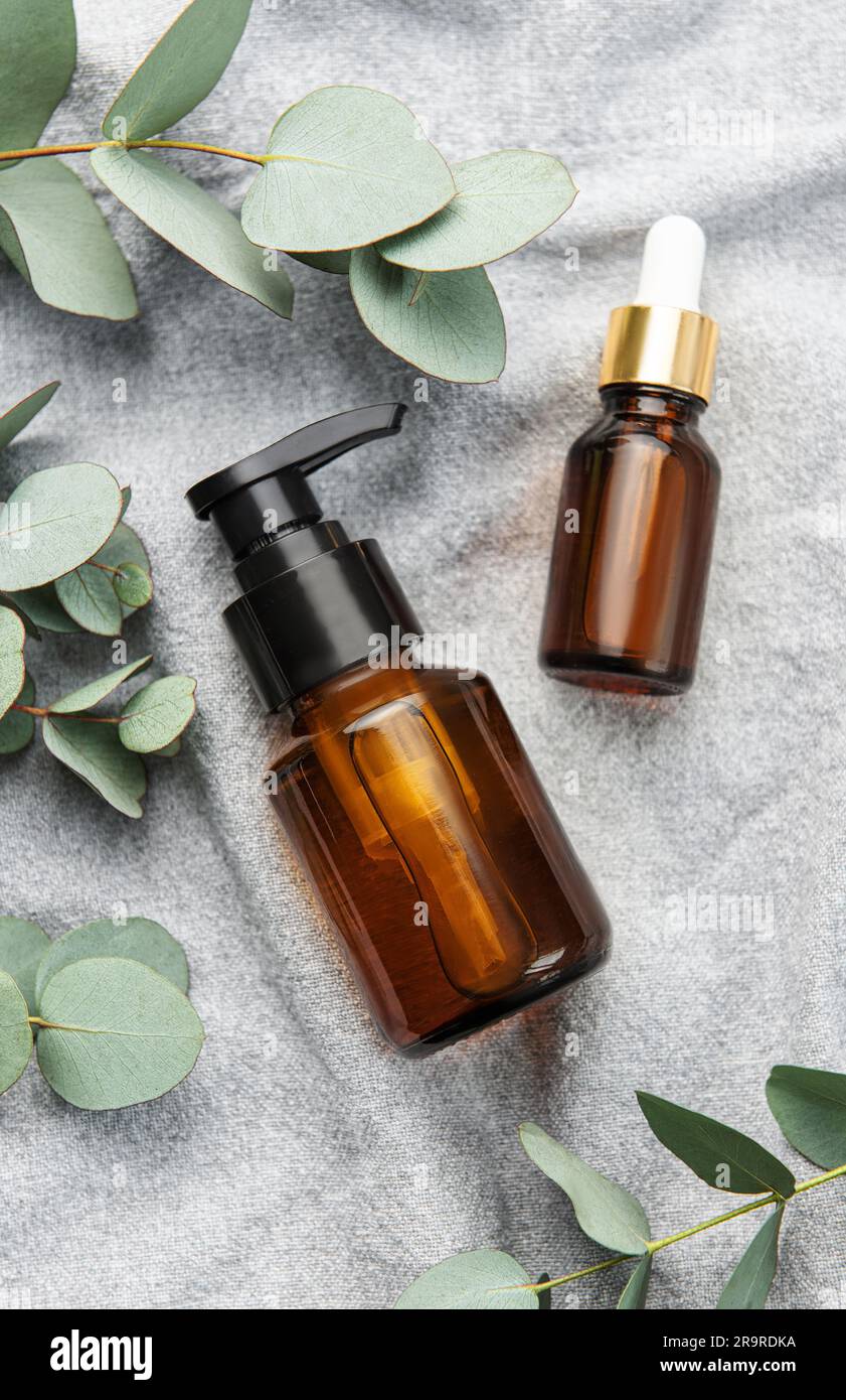 Massage and Spa products with eucalyptus on a textile fabric background ...