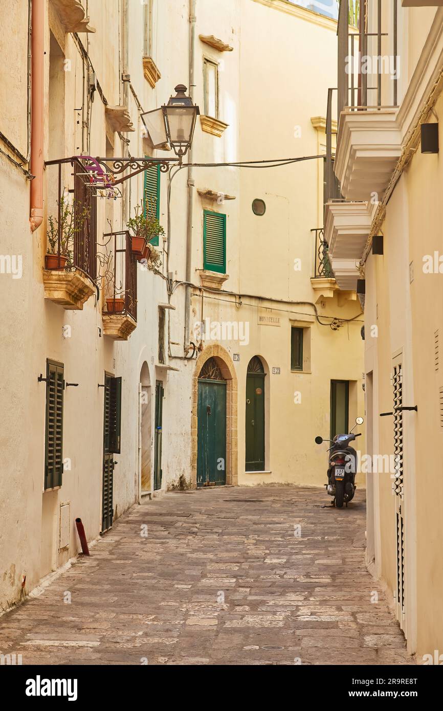 Travel destination. Old street in city with road and stone buildings ...