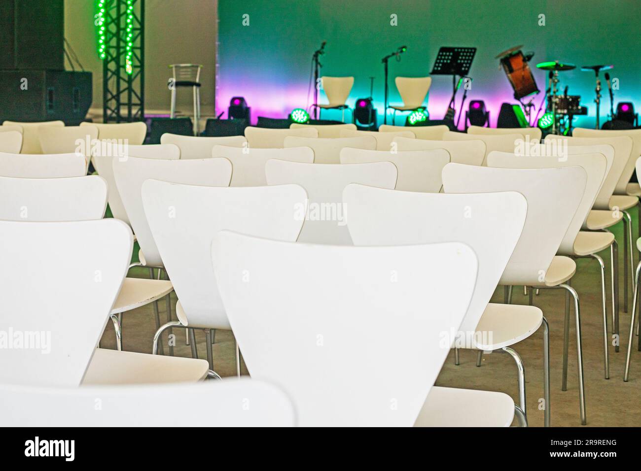 music stage before performance with white chairs. horizontal Stock ...