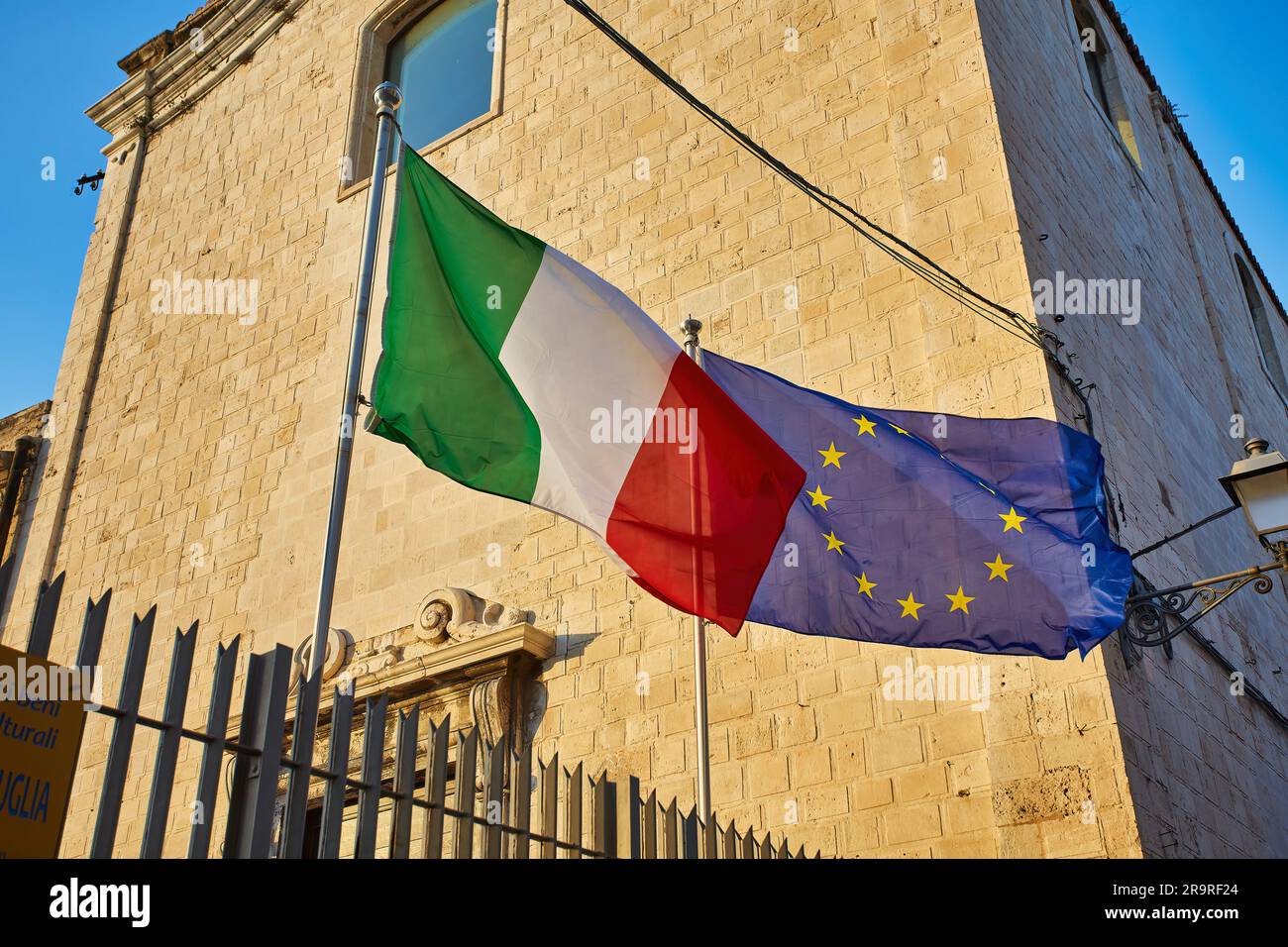 National flag of Italy and European Union EU on the building Stock ...