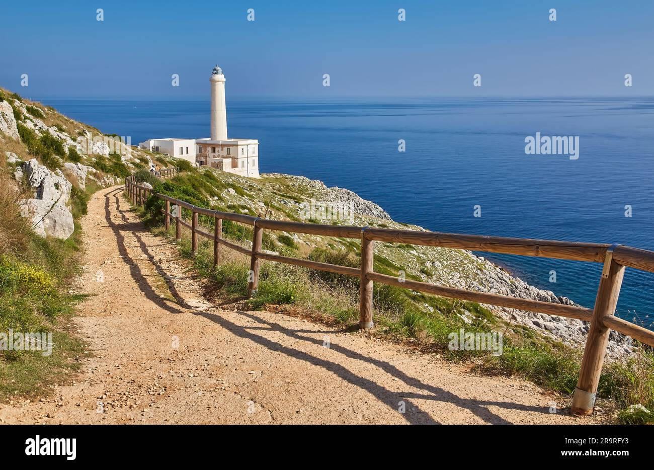 The lighthouse of Cape of Otranto in Apulia standing on hard granite ...