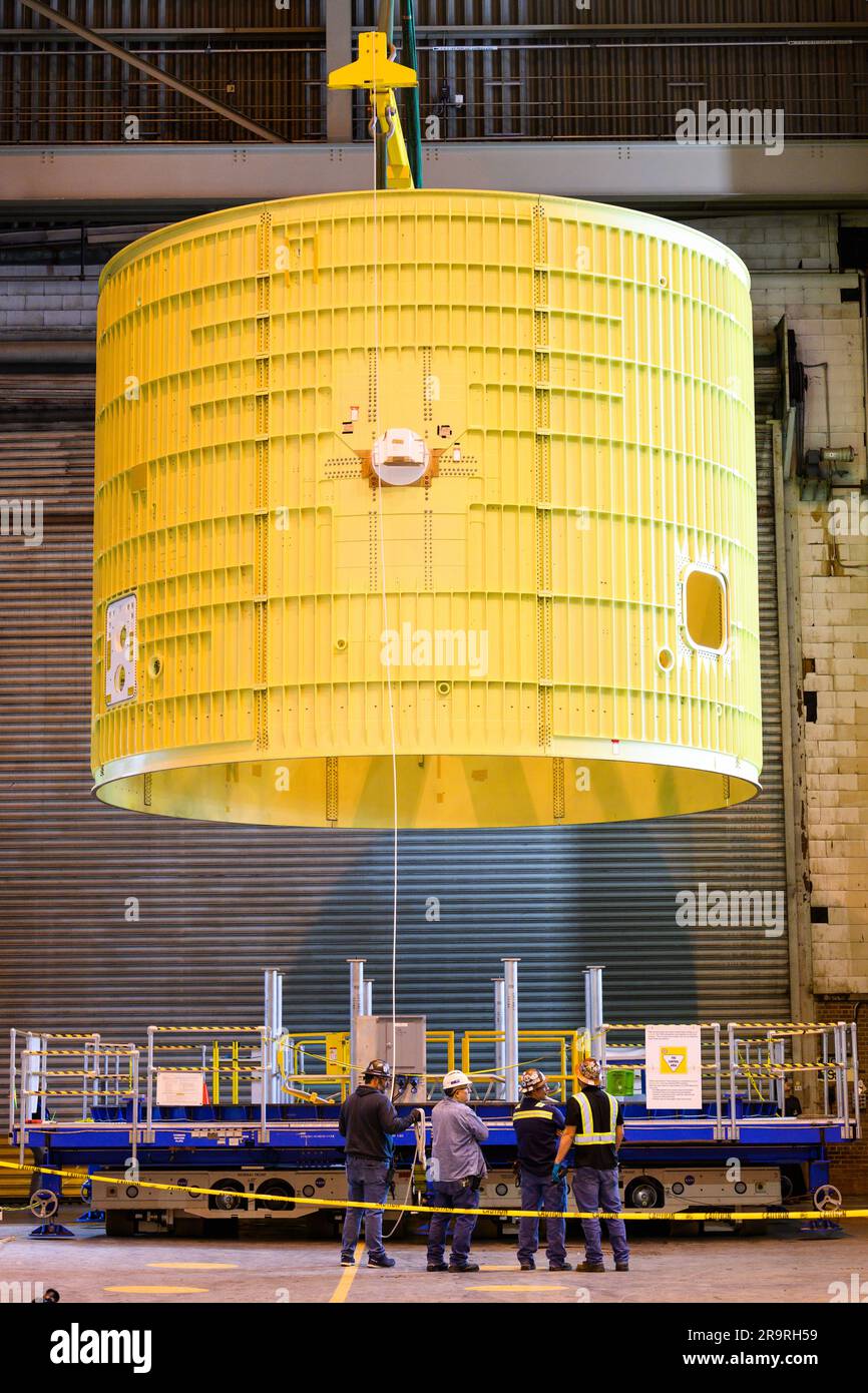 Technicians at NASA’s Michoud Assembly Facility moved the Artemis III ...