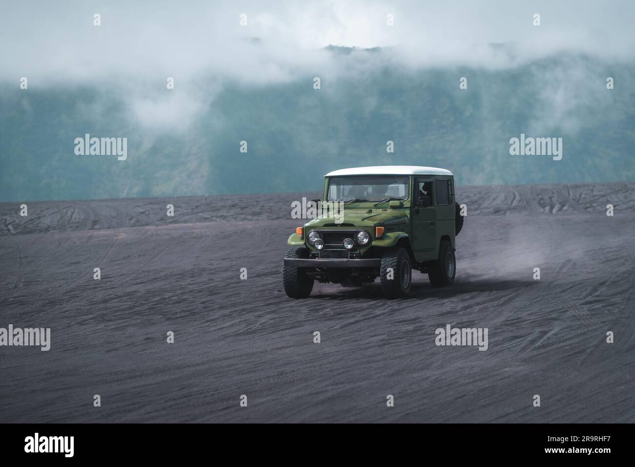 Travelling jeep driving trip in Bromo mount volcano territory. Vehicle ...