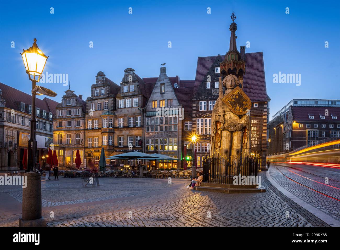 The statue of Roland is illuminated in the center city of Bremen, a ...