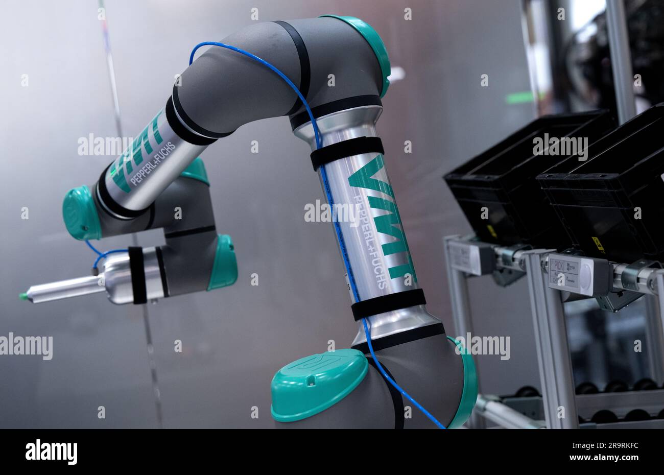 Munich, Germany. 28th June, 2023. A robot arm from Pepperl Fuchs can be ...
