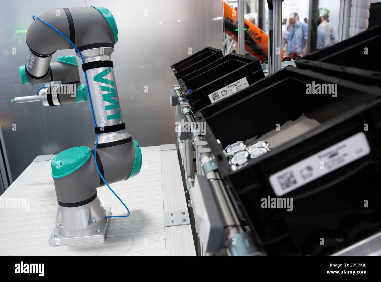 Munich, Germany. 28th June, 2023. A robot arm from Pepperl Fuchs can be ...