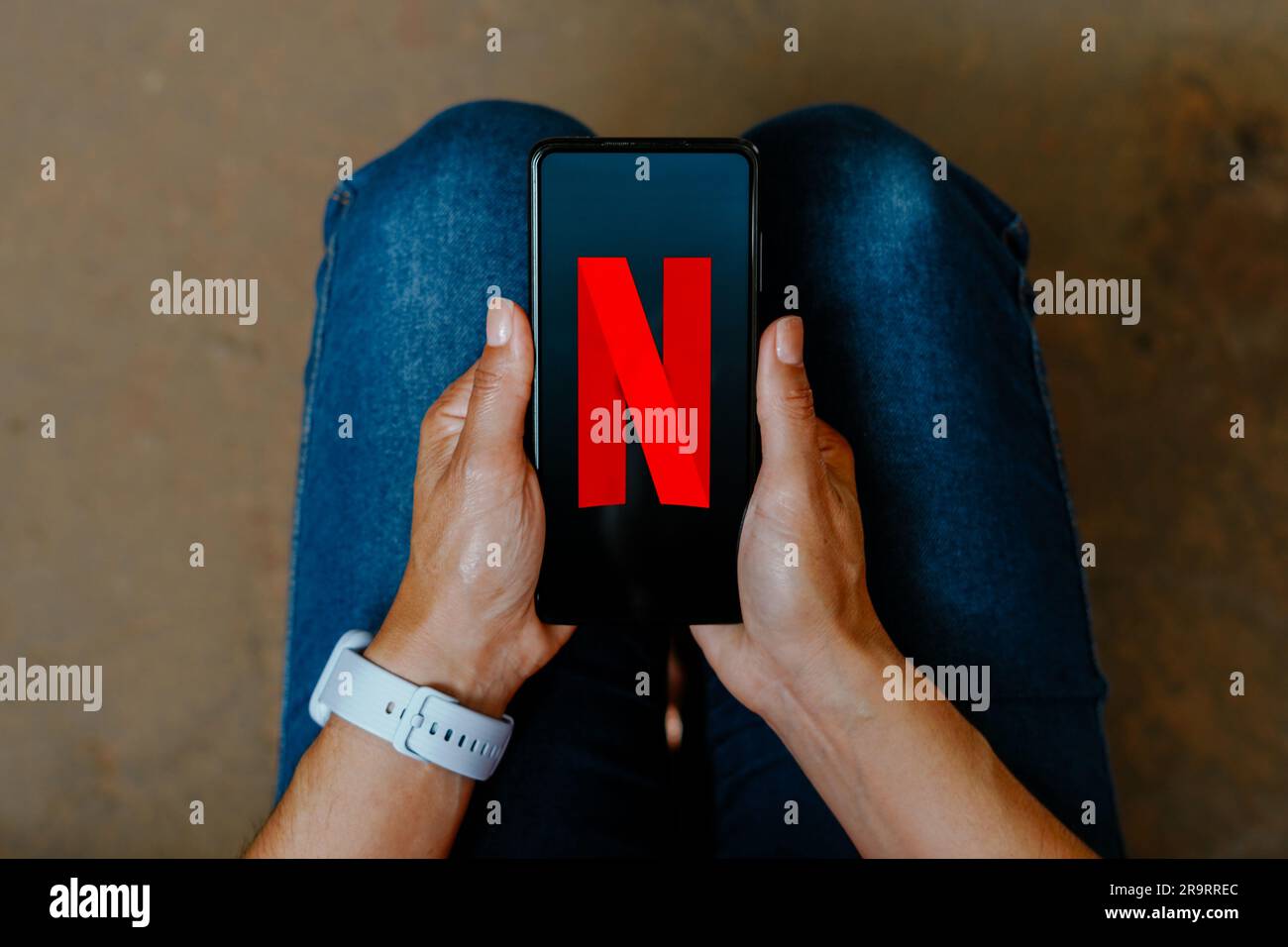 In this photo illustration, the Netflix logo is displayed on a ...