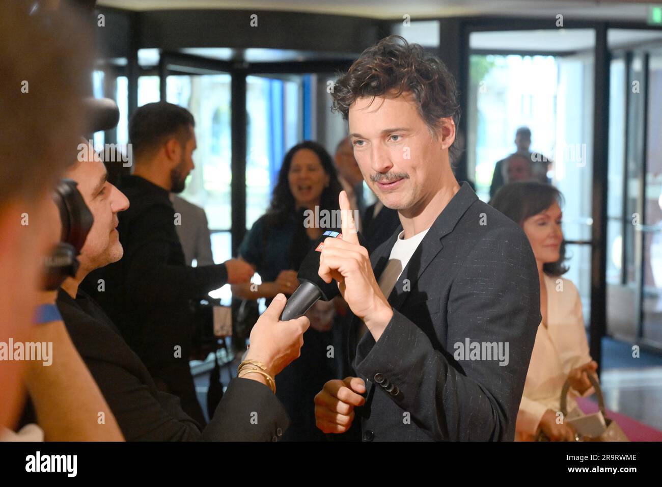 Munich, Germany. 28th June, 2023. Actor Florian David Fitz gives an ...