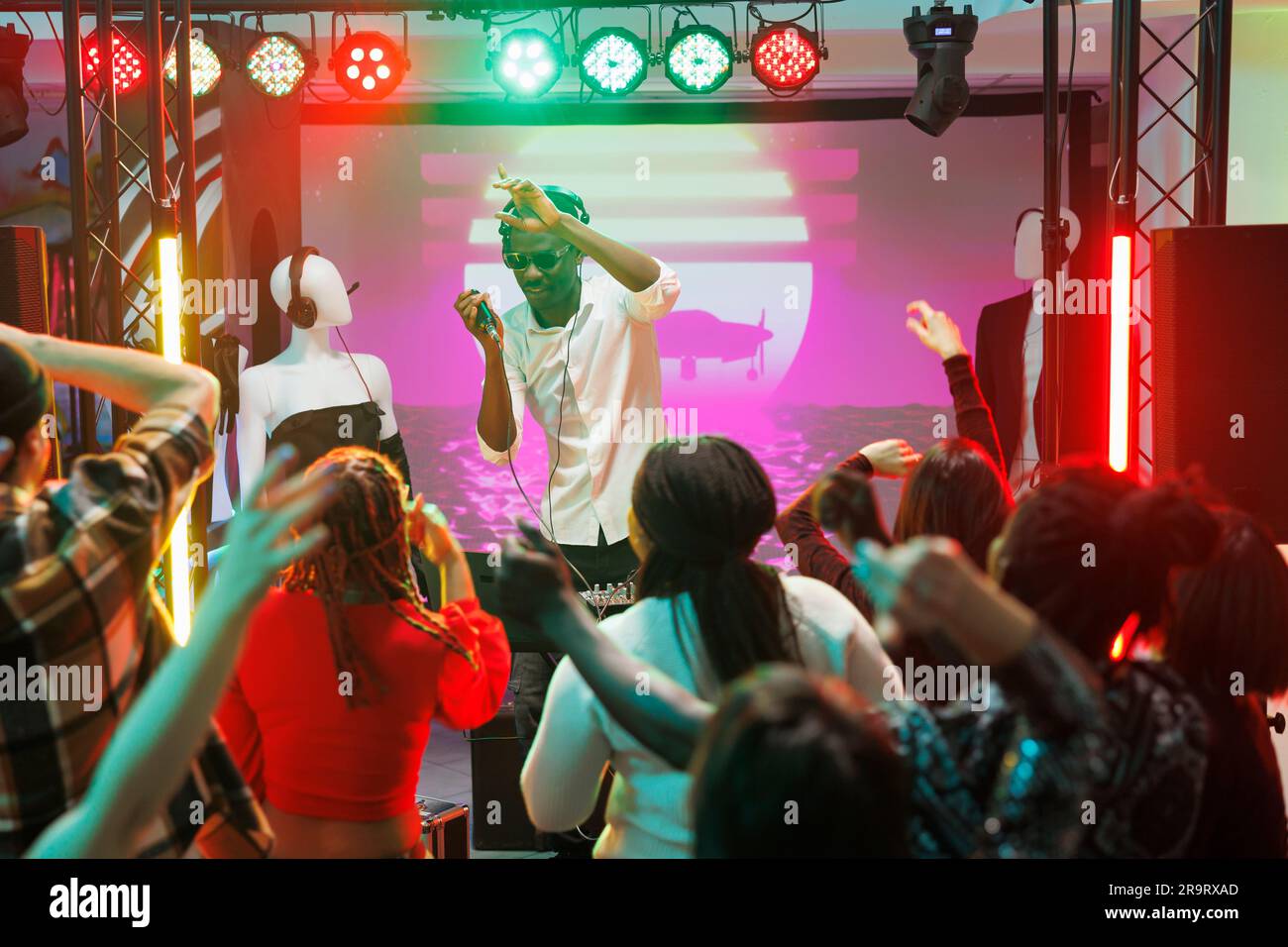 Dj in headphones moving music hi-res stock photography and images - Alamy