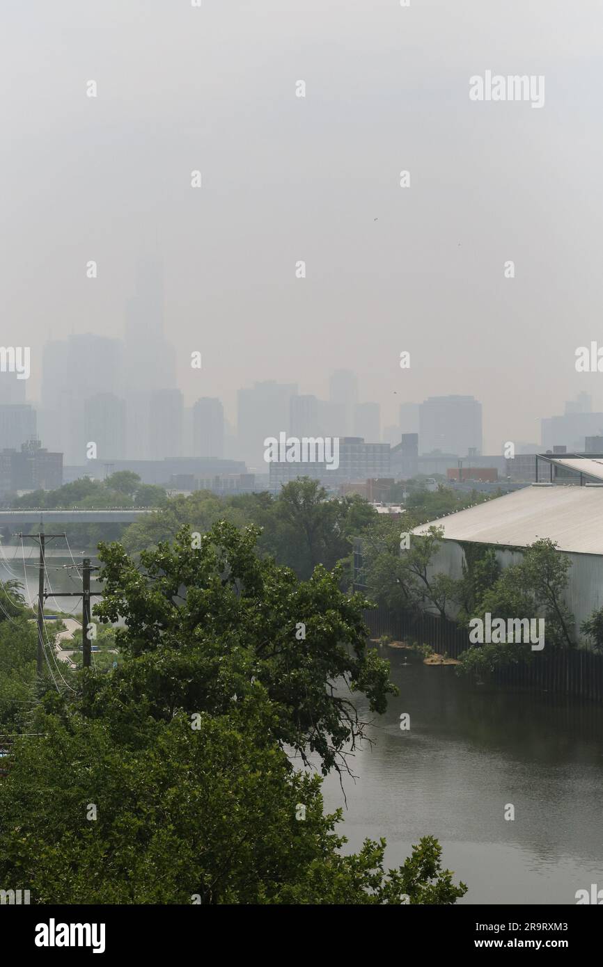The downtown skyline and the iconic Willis Tower are obscured by heavy ...