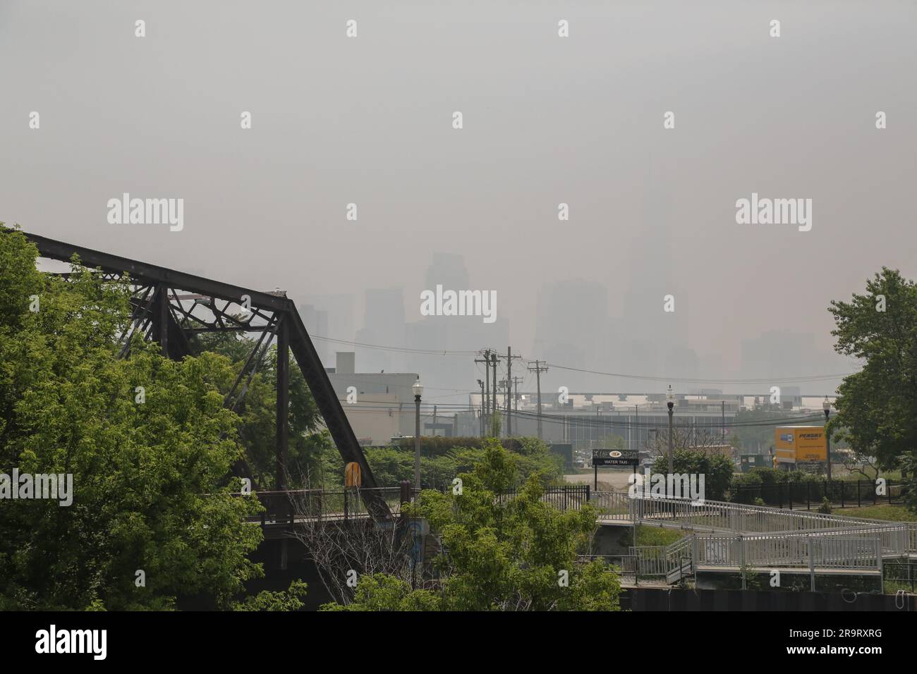 The downtown skyline and the iconic Willis Tower are obscured by heavy ...
