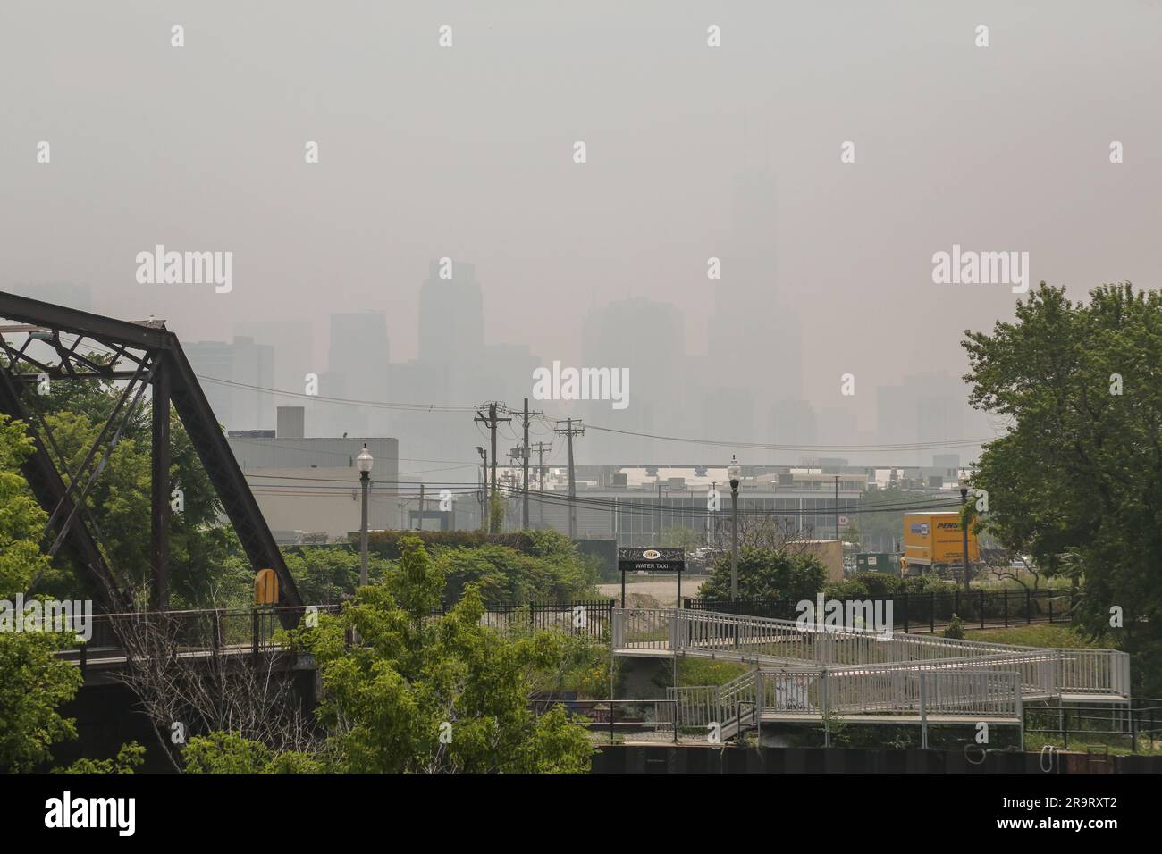 The downtown skyline and the iconic Willis Tower are obscured by heavy ...