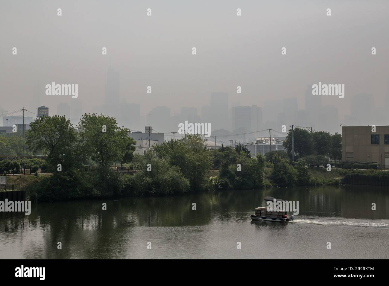 The downtown skyline and the iconic Willis Tower are obscured by heavy ...