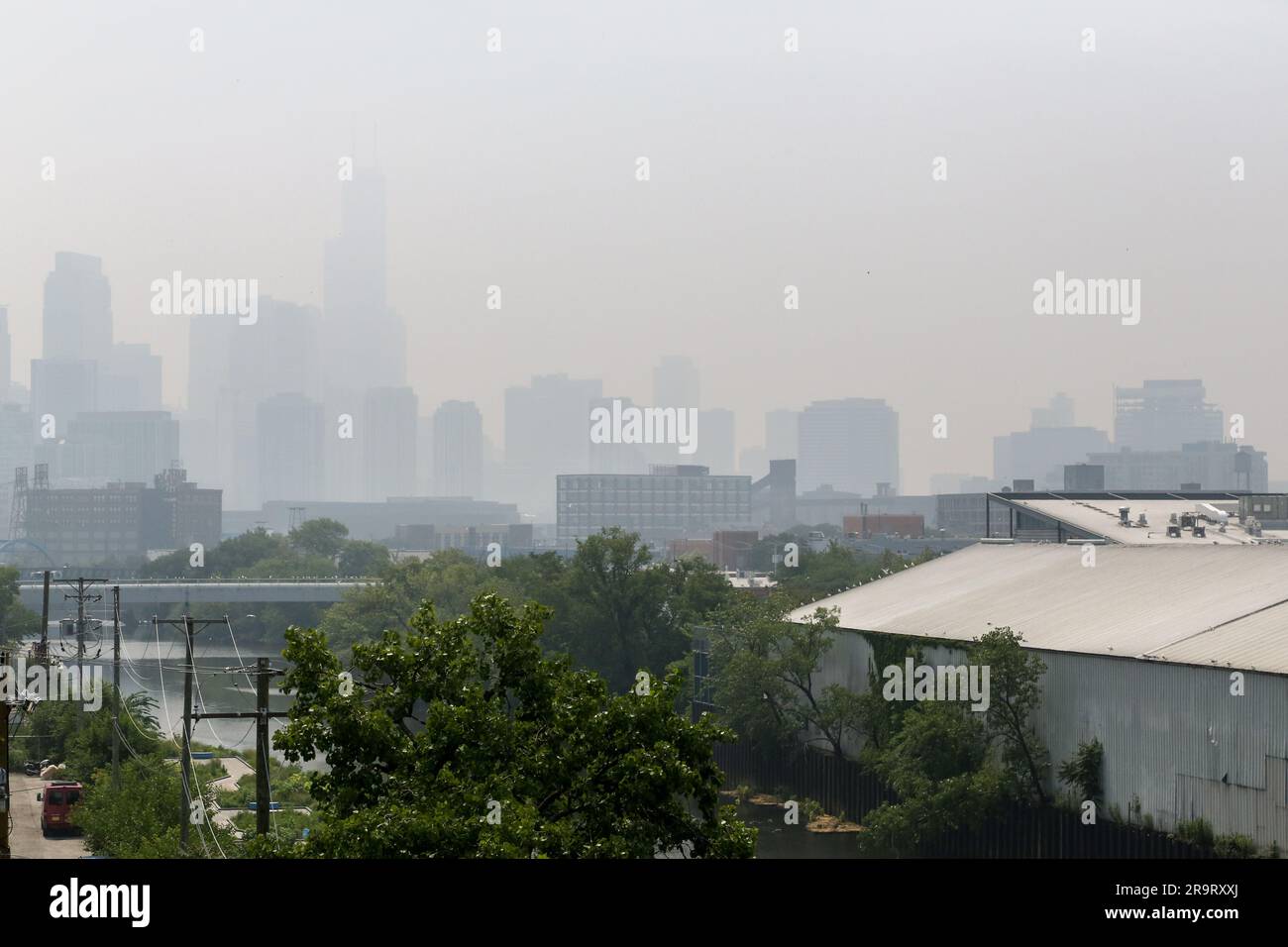 The downtown skyline and the iconic Willis Tower are obscured by heavy ...