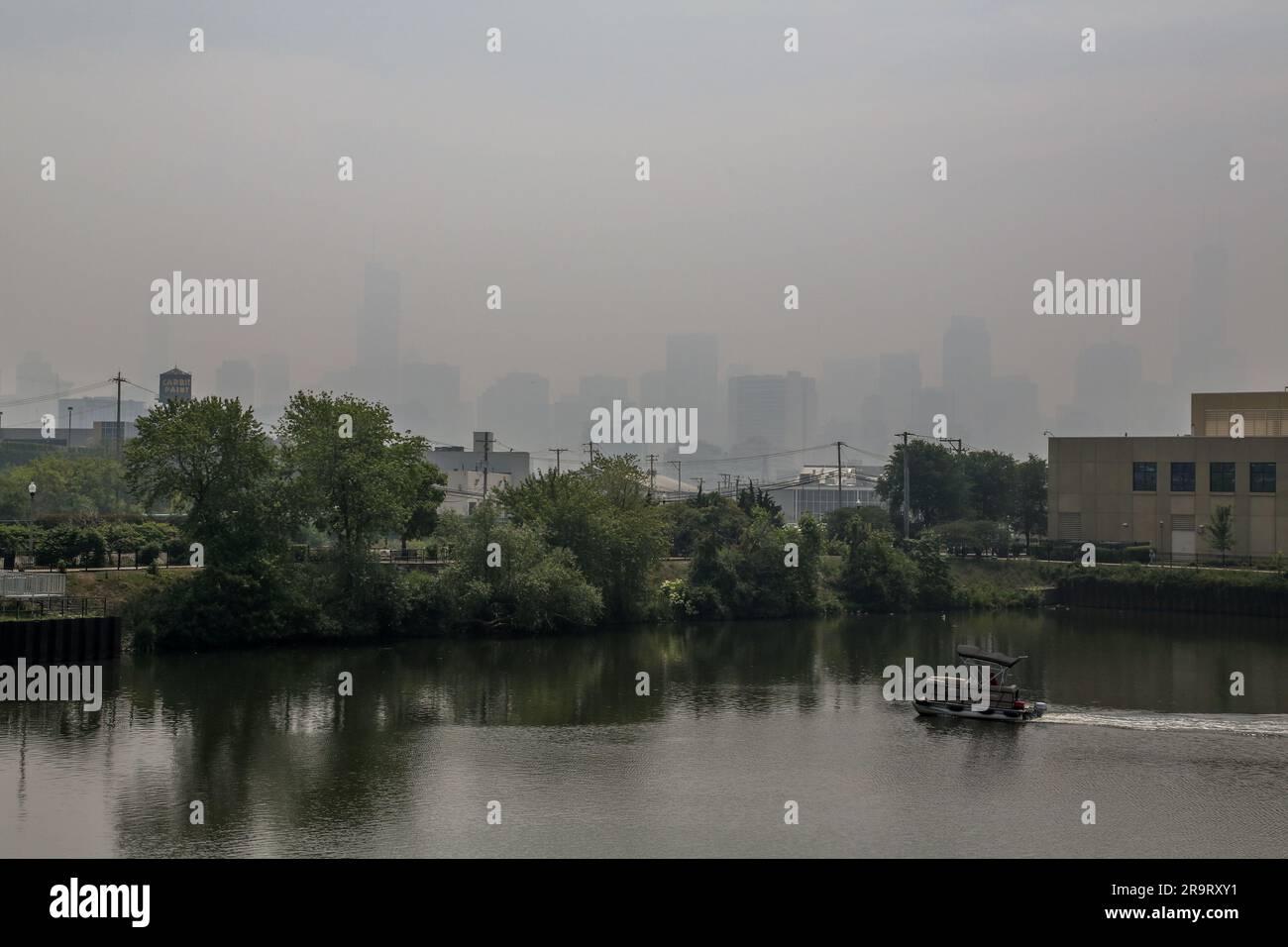 The downtown skyline and the iconic Willis Tower are obscured by heavy ...
