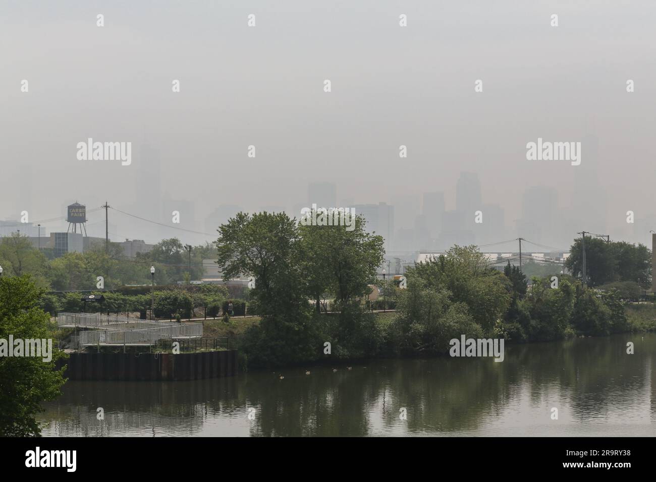 The downtown skyline and the iconic Willis Tower are obscured by heavy ...