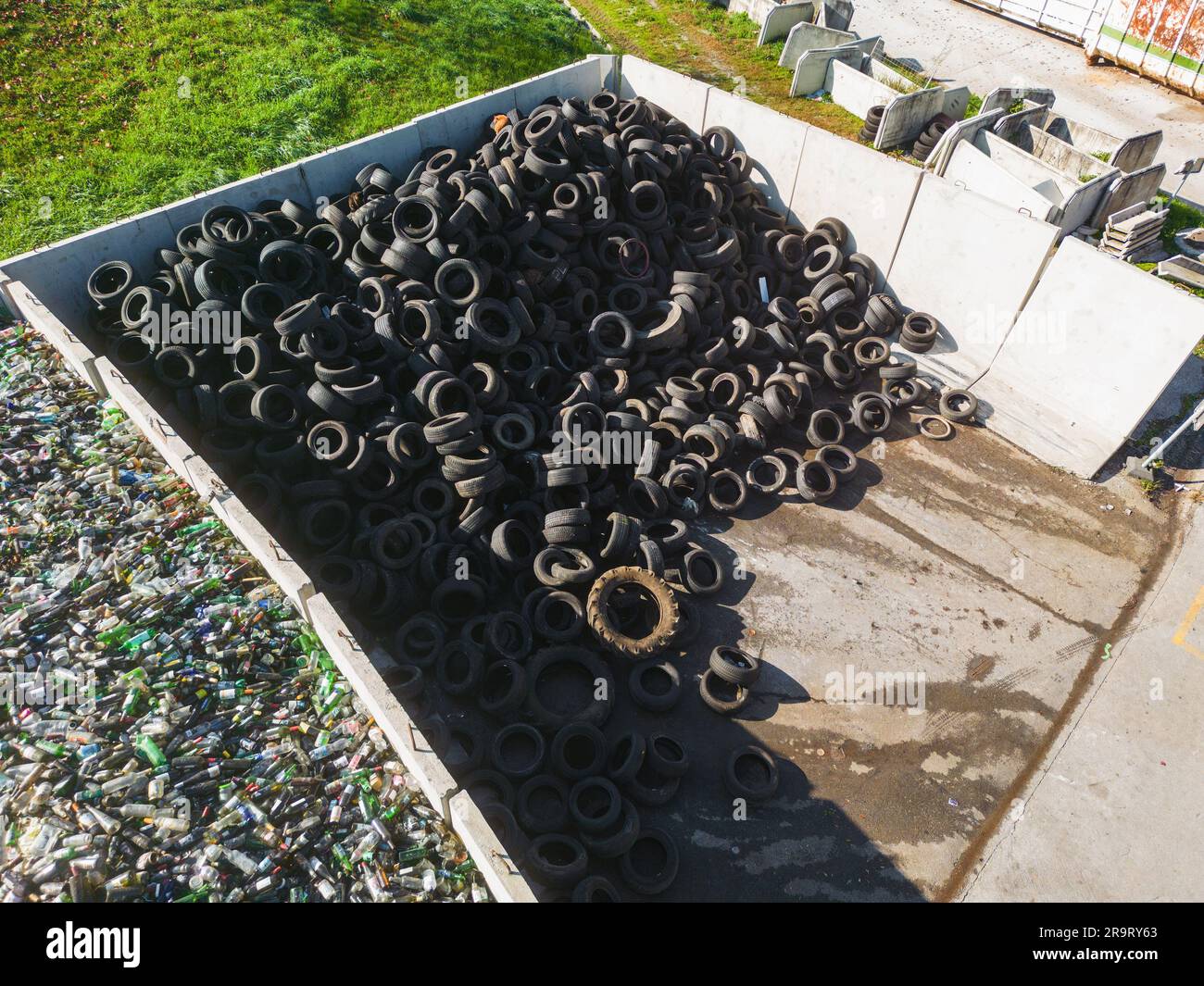 Heap of old used industrial rubber tires specially selected from the ...