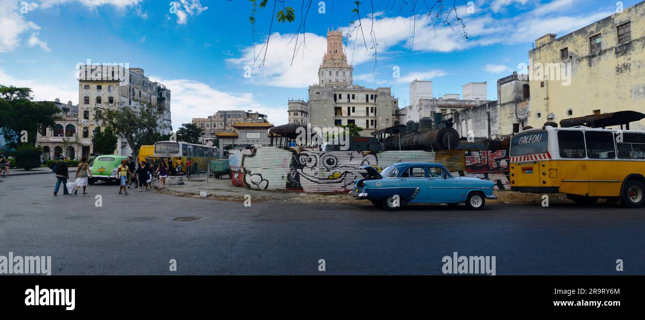 Vintage cars and buses on street, Havana, La Habana, Cuba Stock Photo ...
