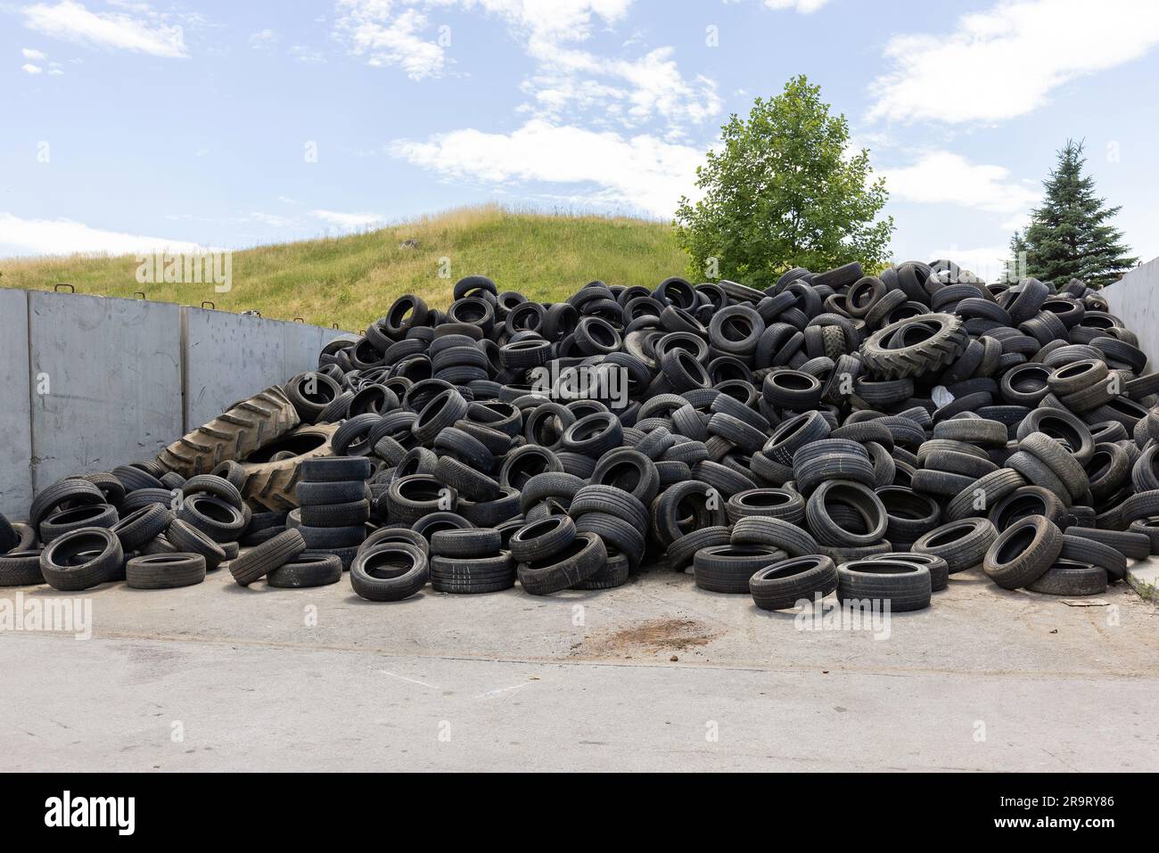 Heap of old used industrial rubber tires specially selected from the ...