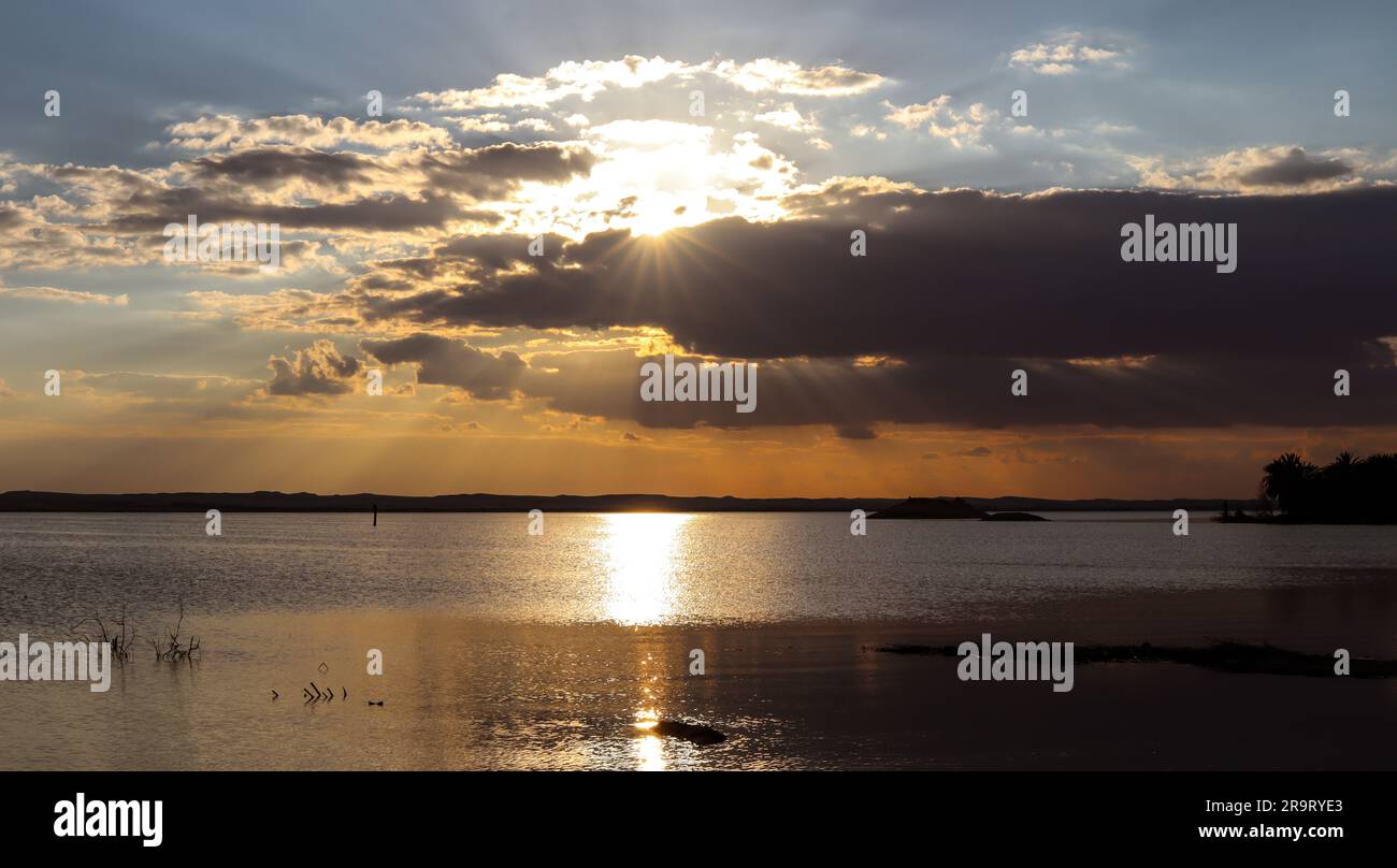 Amazing sunset in siwa oasis of Egypt Stock Photo - Alamy