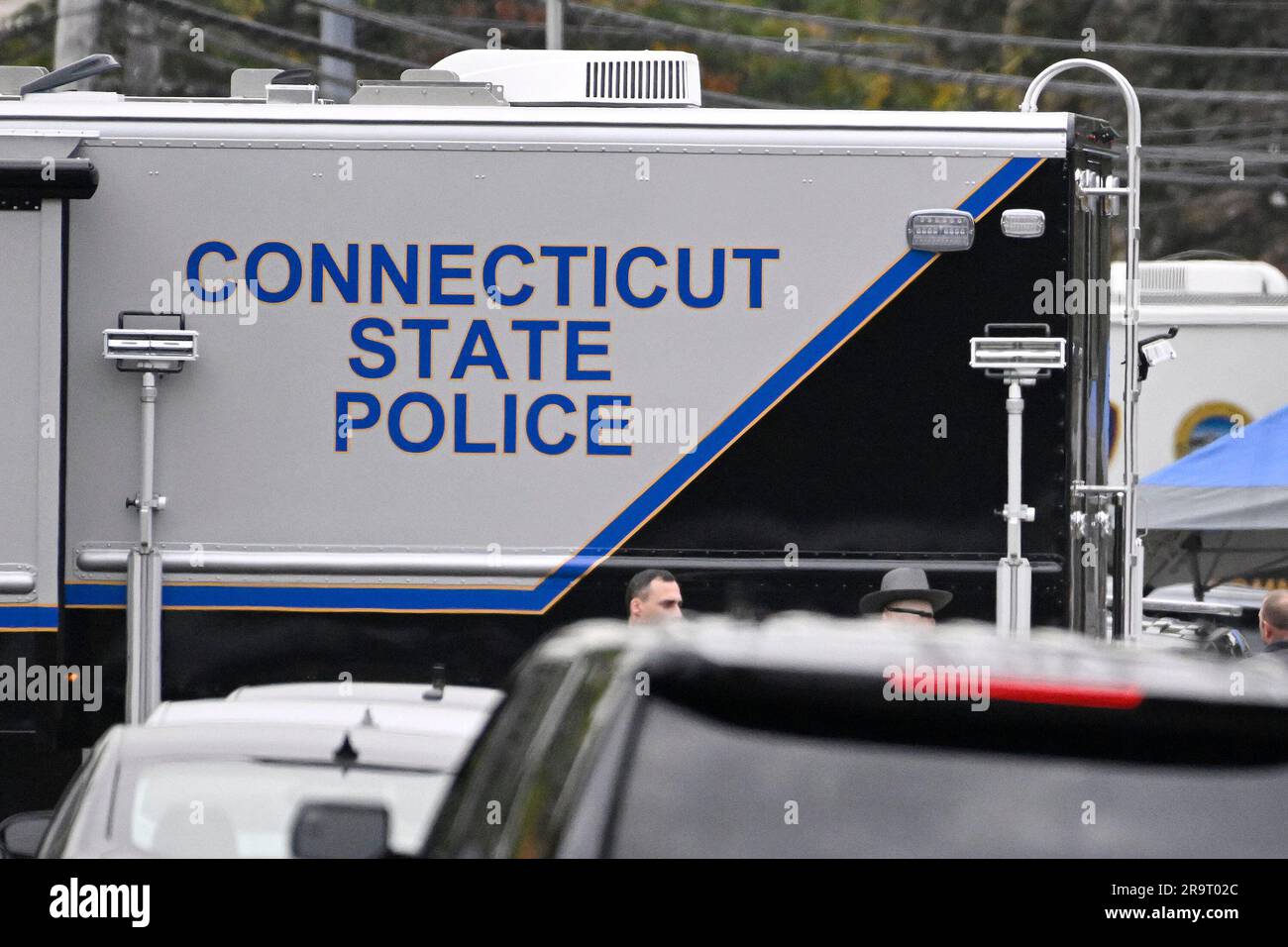 FILE - Members of the Connecticut State Police Major Crime Unit on ...