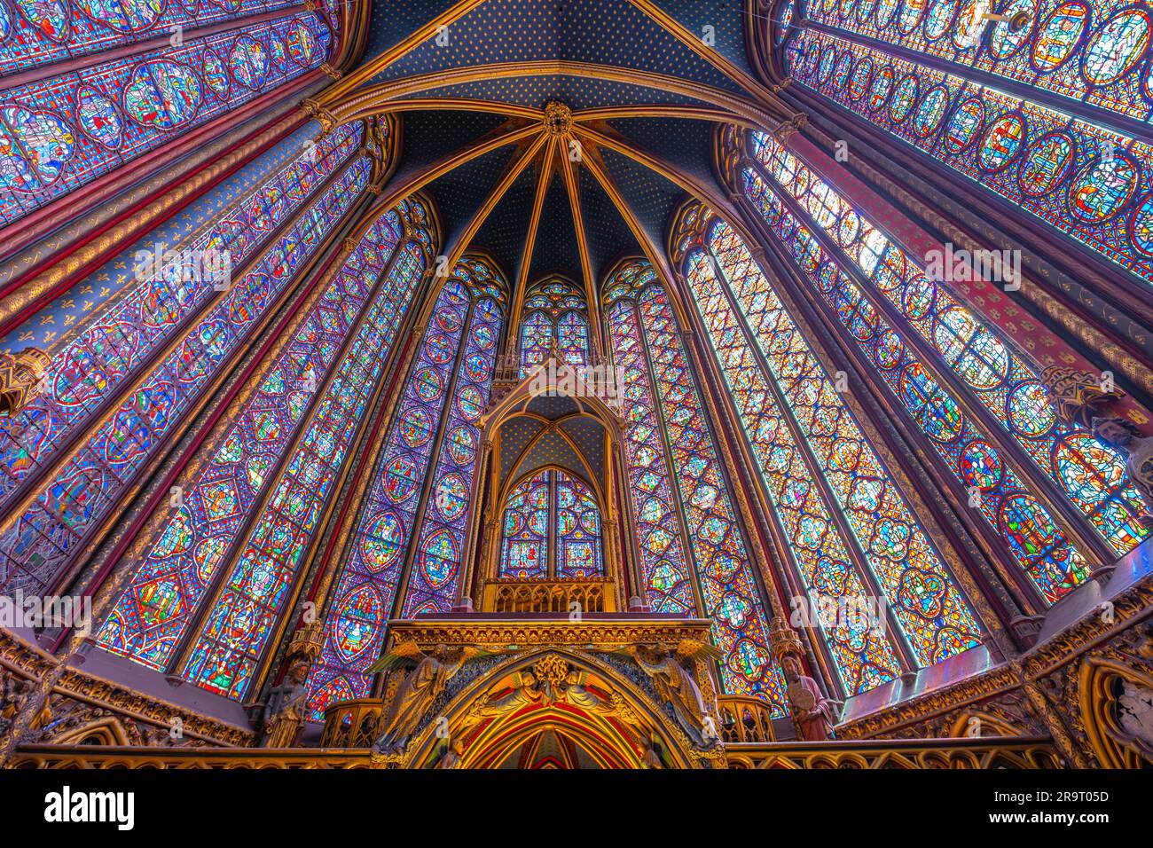 Monumental interior of Sainte-Chapelle with stained glass windows ...