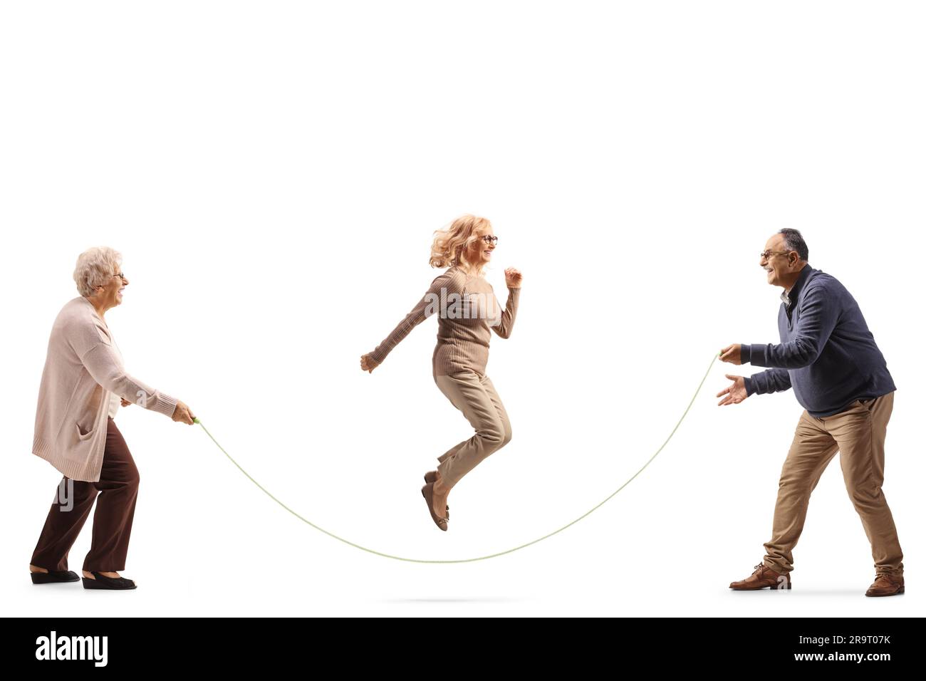 Mature people playing skipping rope isolated on white background Stock ...