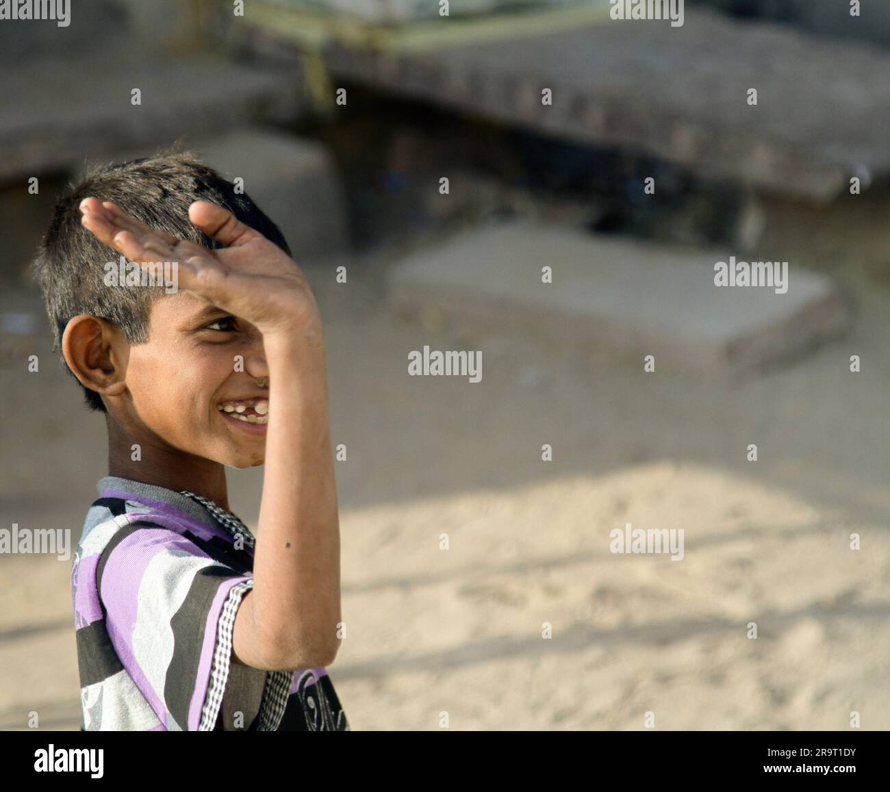 India, Pushkar-March 4, 2018: Laughing Indian boy welcomed gesture ...