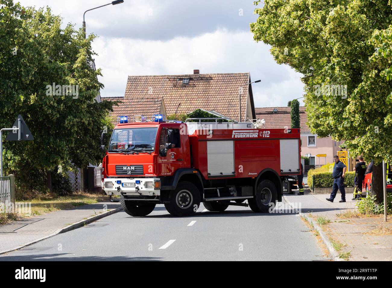 Lichtensee, Germany. 28th June, 2023. A fire truck stands on the road ...
