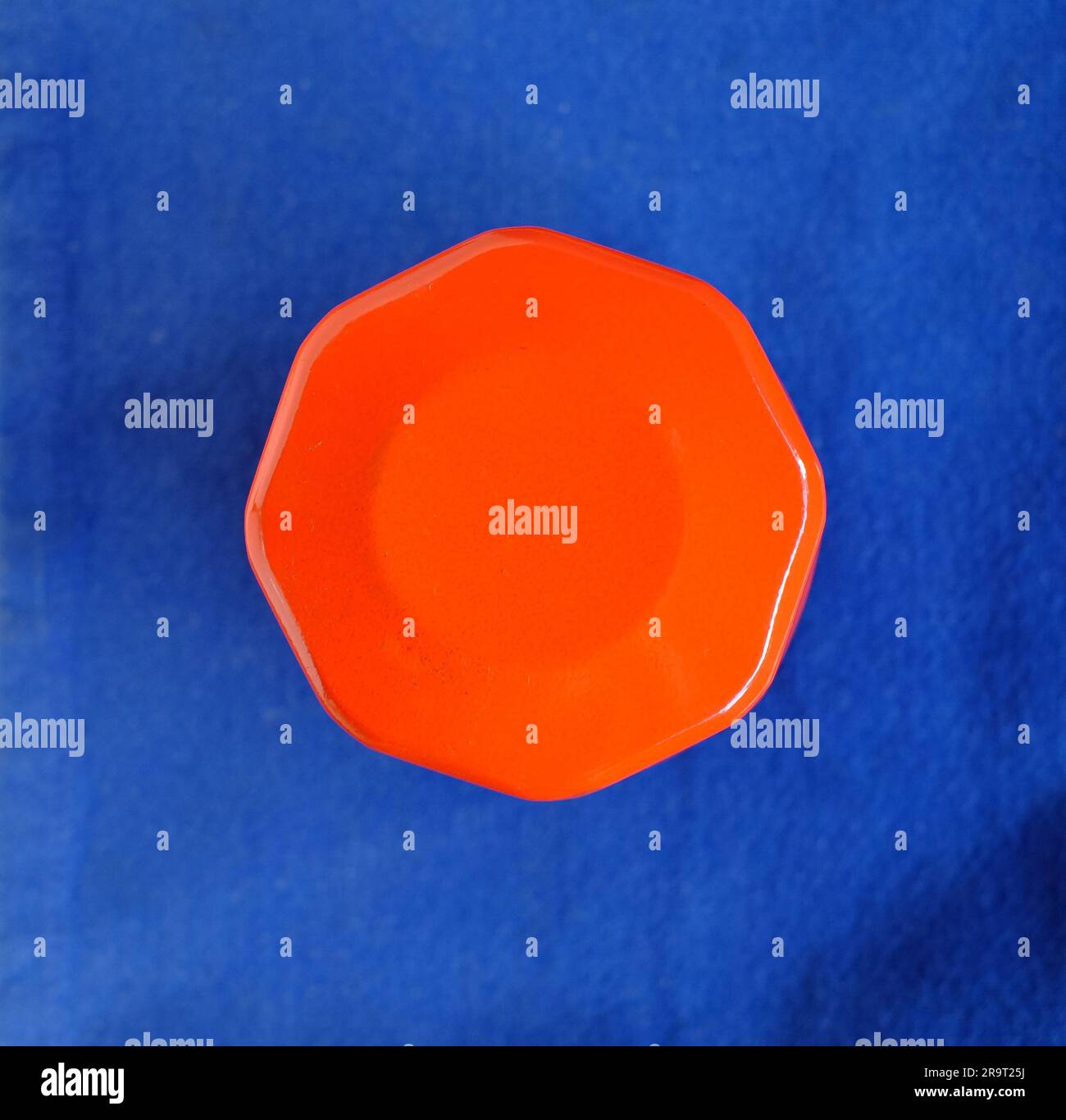OIl filter for diesel engine, orange on blue, top view Stock Photo - Alamy